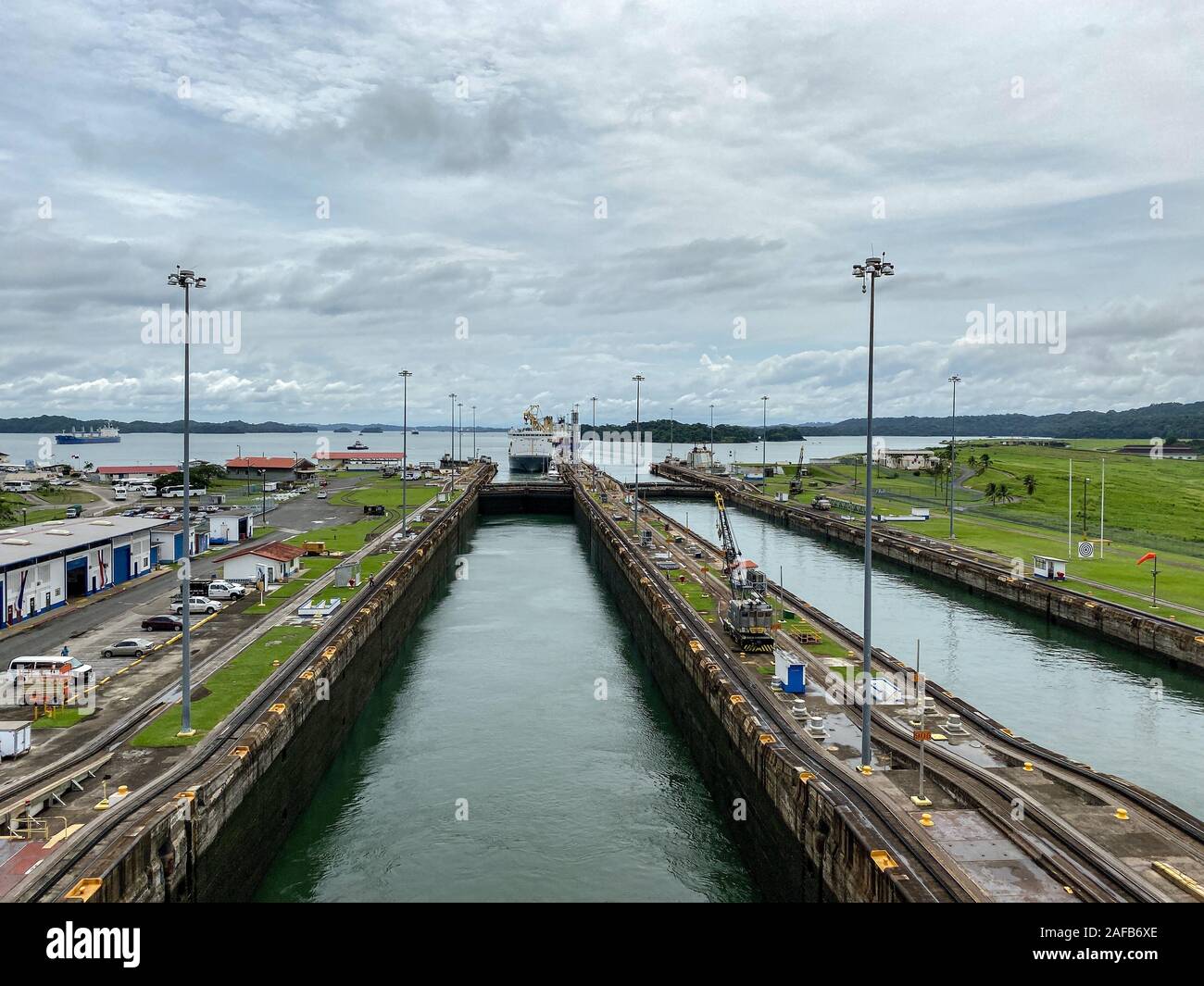 Panama - 11/6/19: A container ship entering the first lock in the ...
