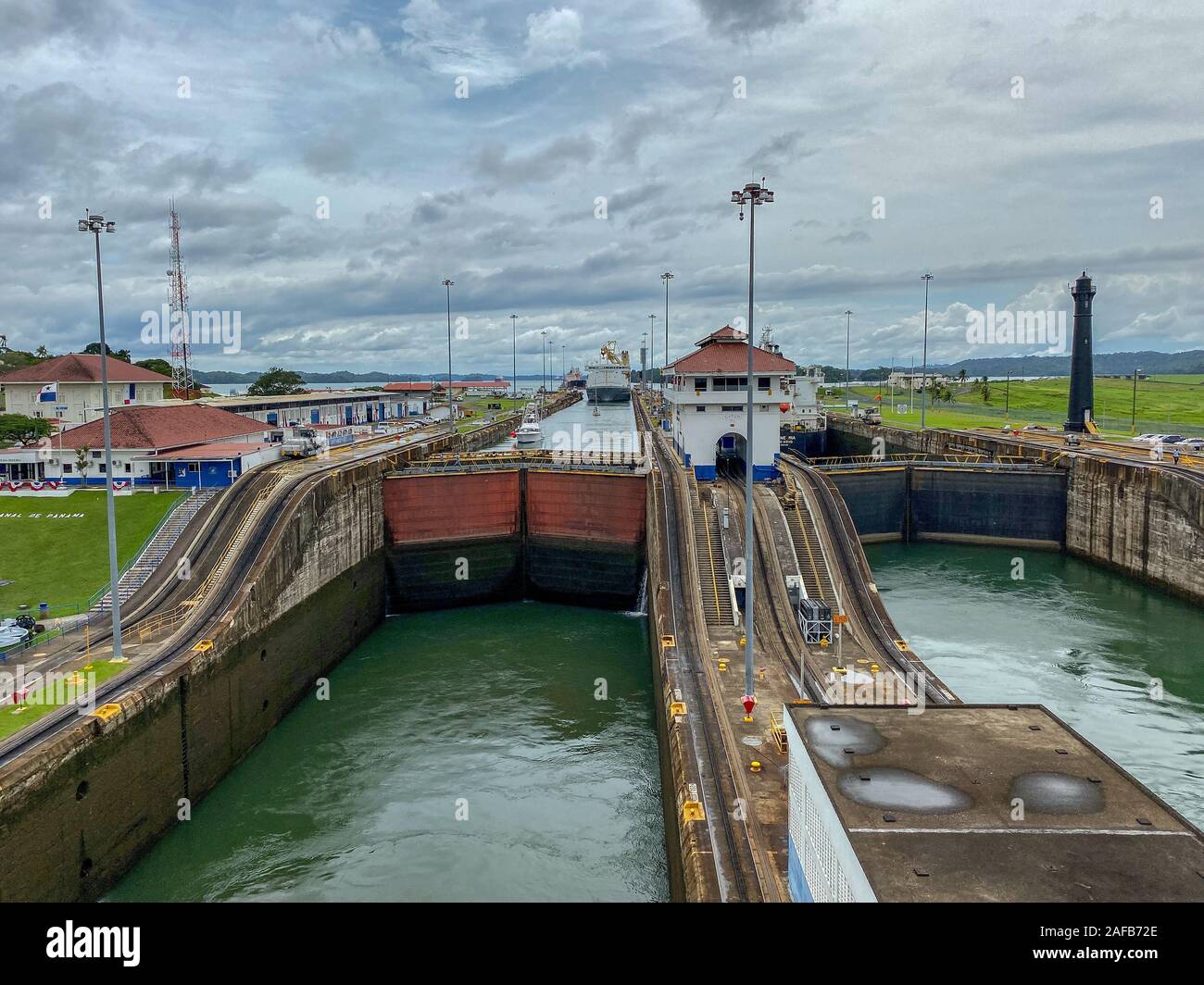 Panama - 11/6/19: A view of a container ship and two yachts entering ...