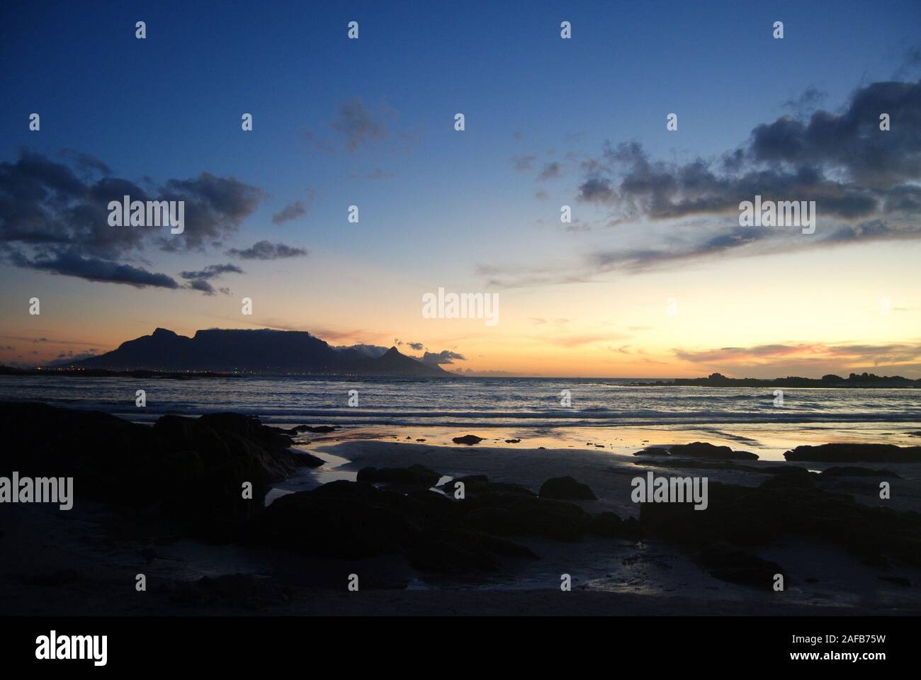 Sunset Behind Table Mountain Stock Photo - Alamy