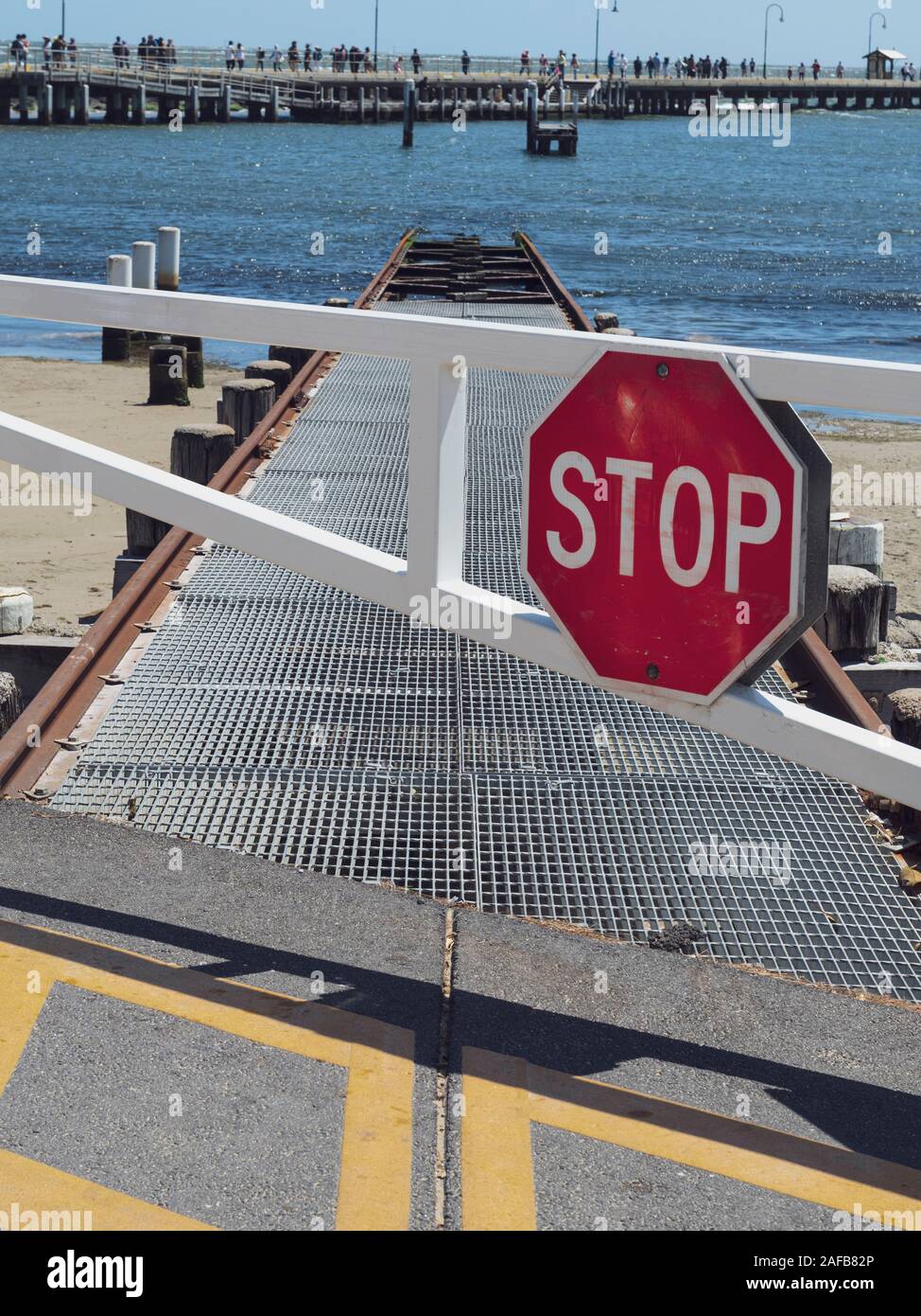 Closed barrier with Stop sign by beach in St Kilda, Melbourne ...