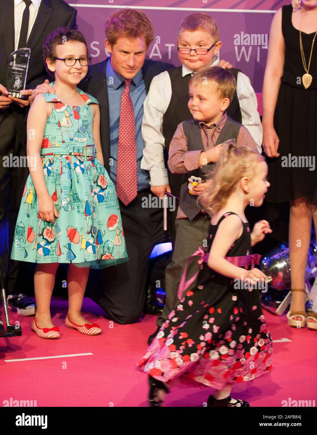 Prince Harry with winners 5 year old Alex Logan, 9 year old Rose ...