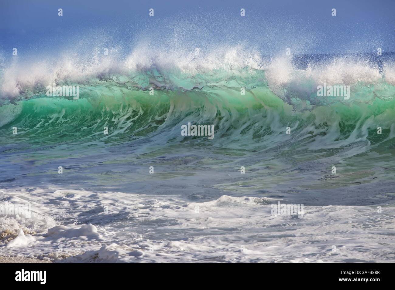 ocean wave falling down under sunset in lombok Stock Photo - Alamy