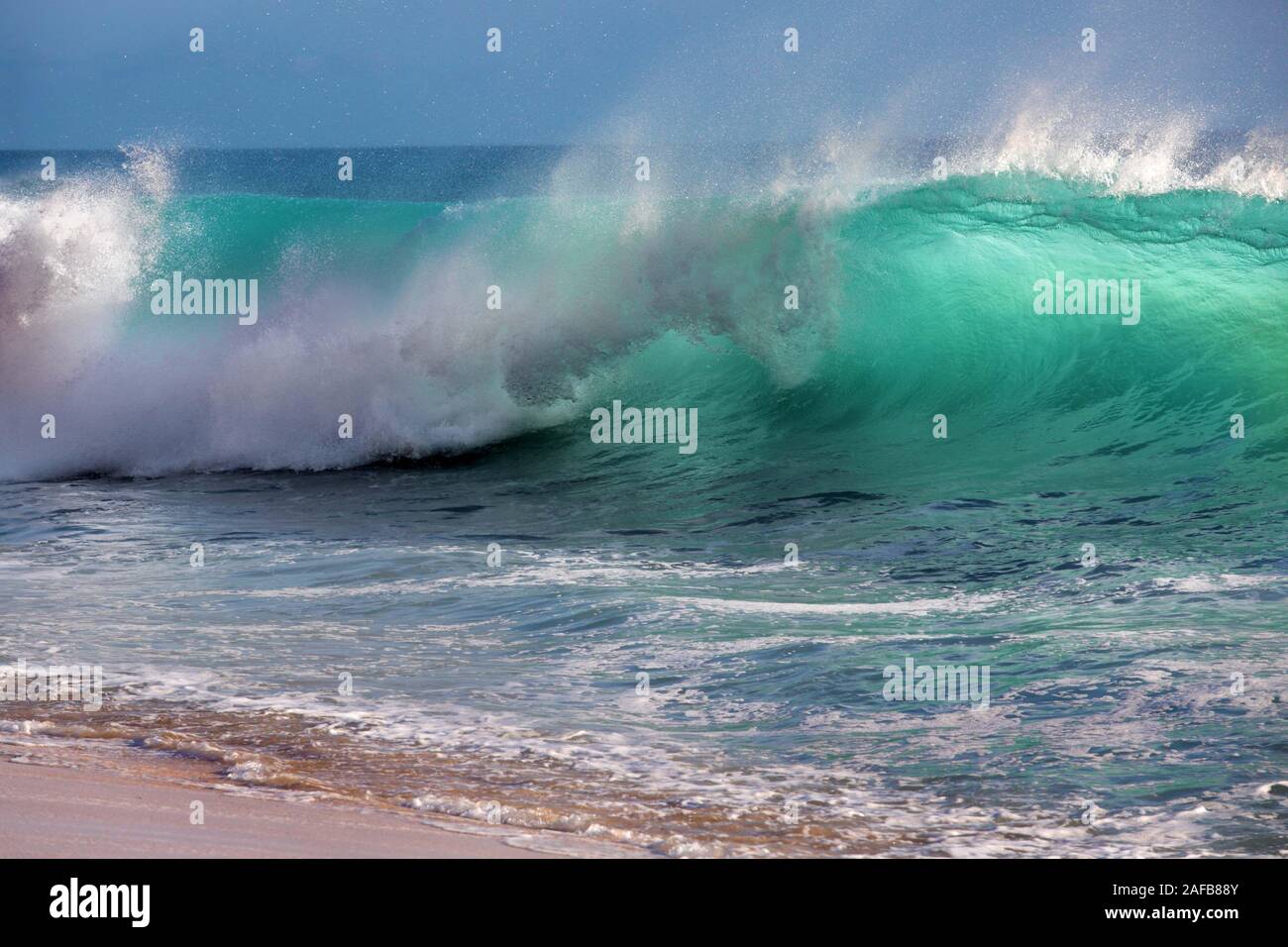 ocean wave falling down under sunset in lombok Stock Photo - Alamy