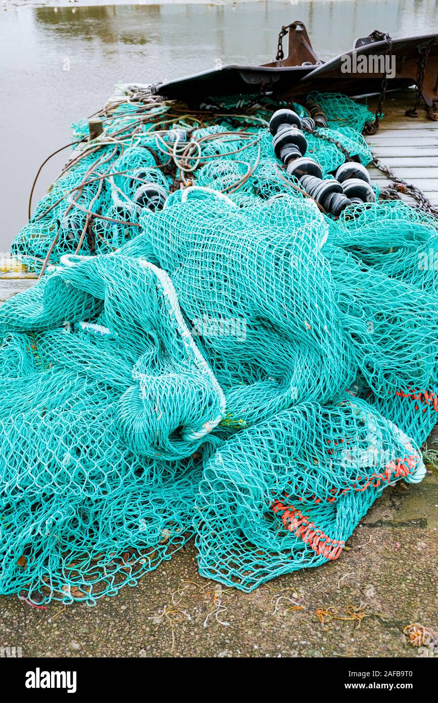 Blue fishing net hi-res stock photography and images - Alamy