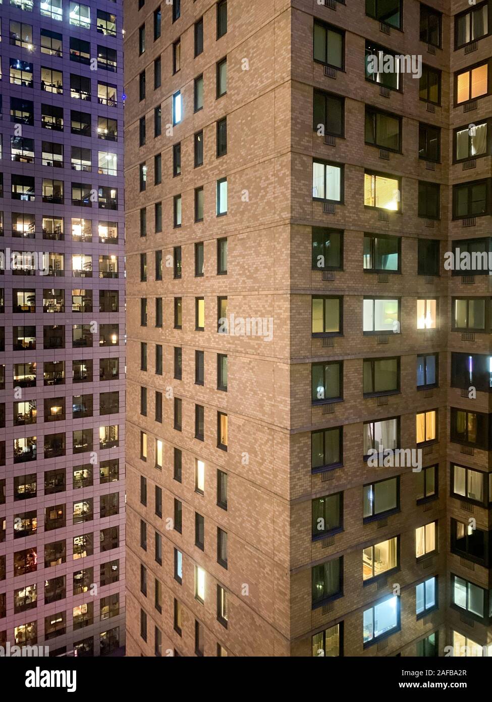 New York cityscape at night up close of towering building Stock Photo ...