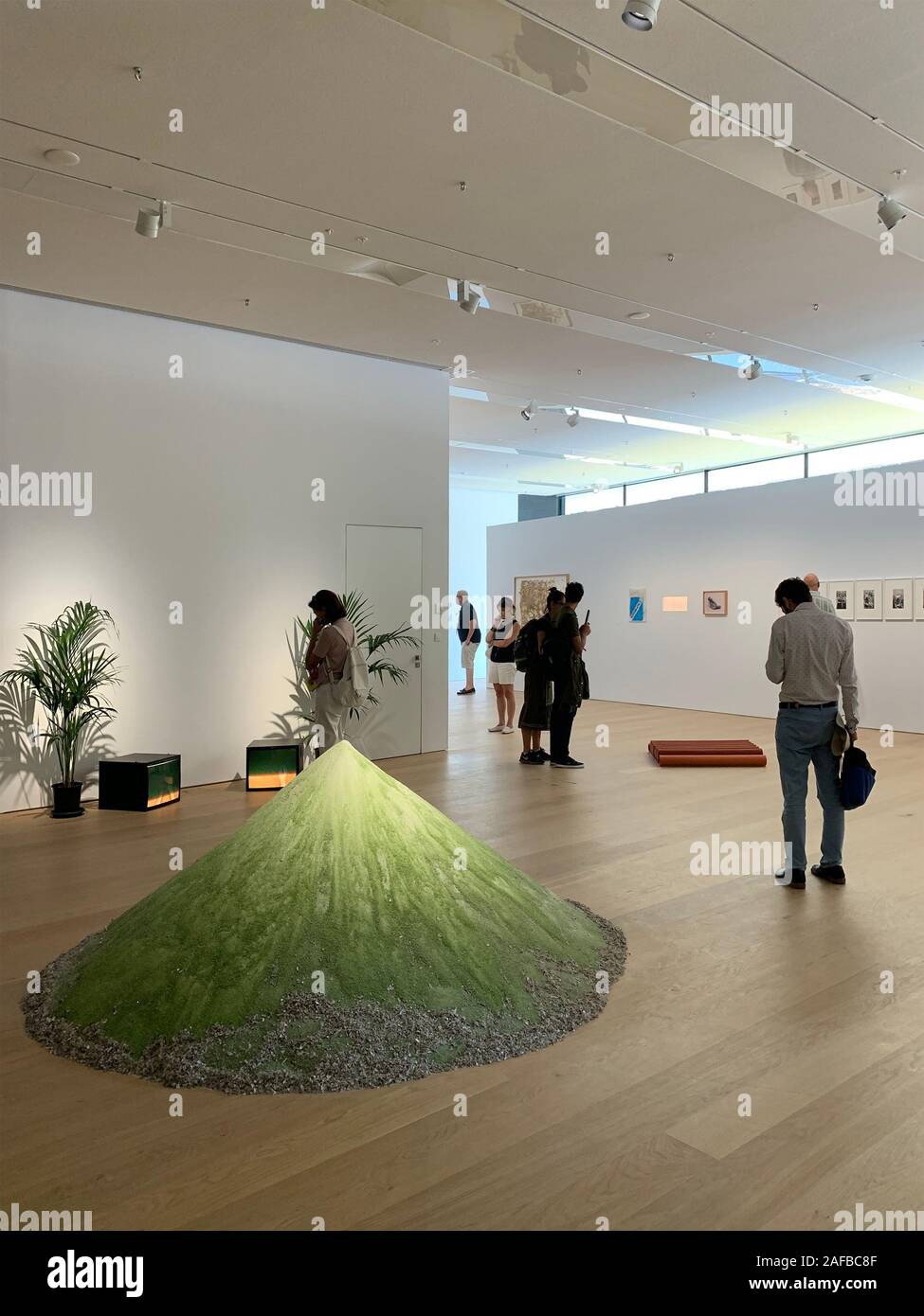 View of people visiting an exhibition at newly opened contemporary art ...