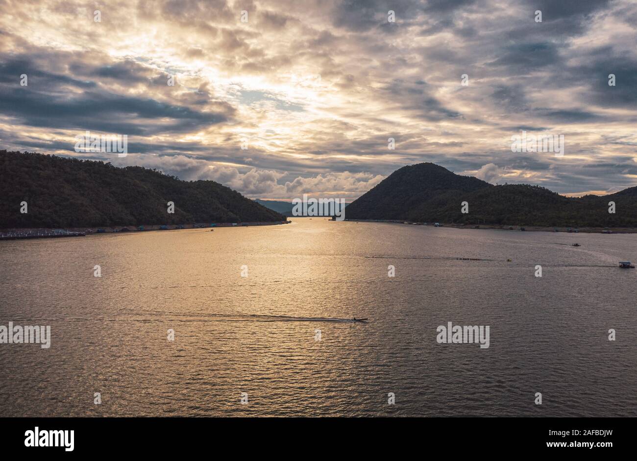 Aerial view, Scenery of Srinagarind dam in valley at sunset ...