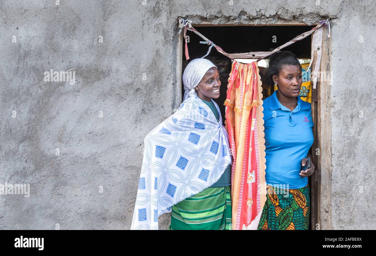 Same, Tanzania, 5th June 2019: maasai ladies at the door, looking out ...