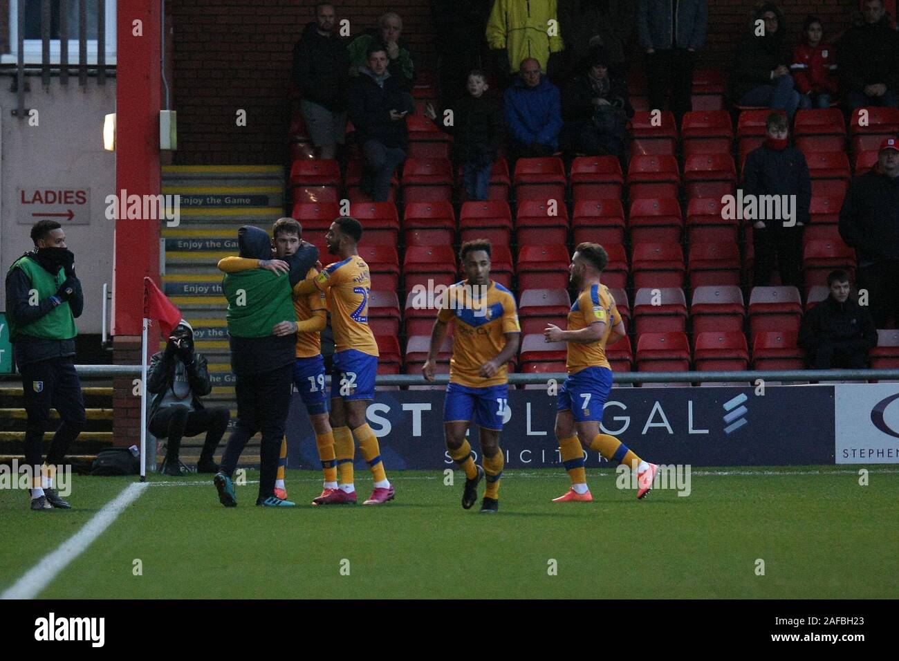 Crewe, UK. 14th Dec, 2019. Andy Cook of Mansfield Town celebrates his ...