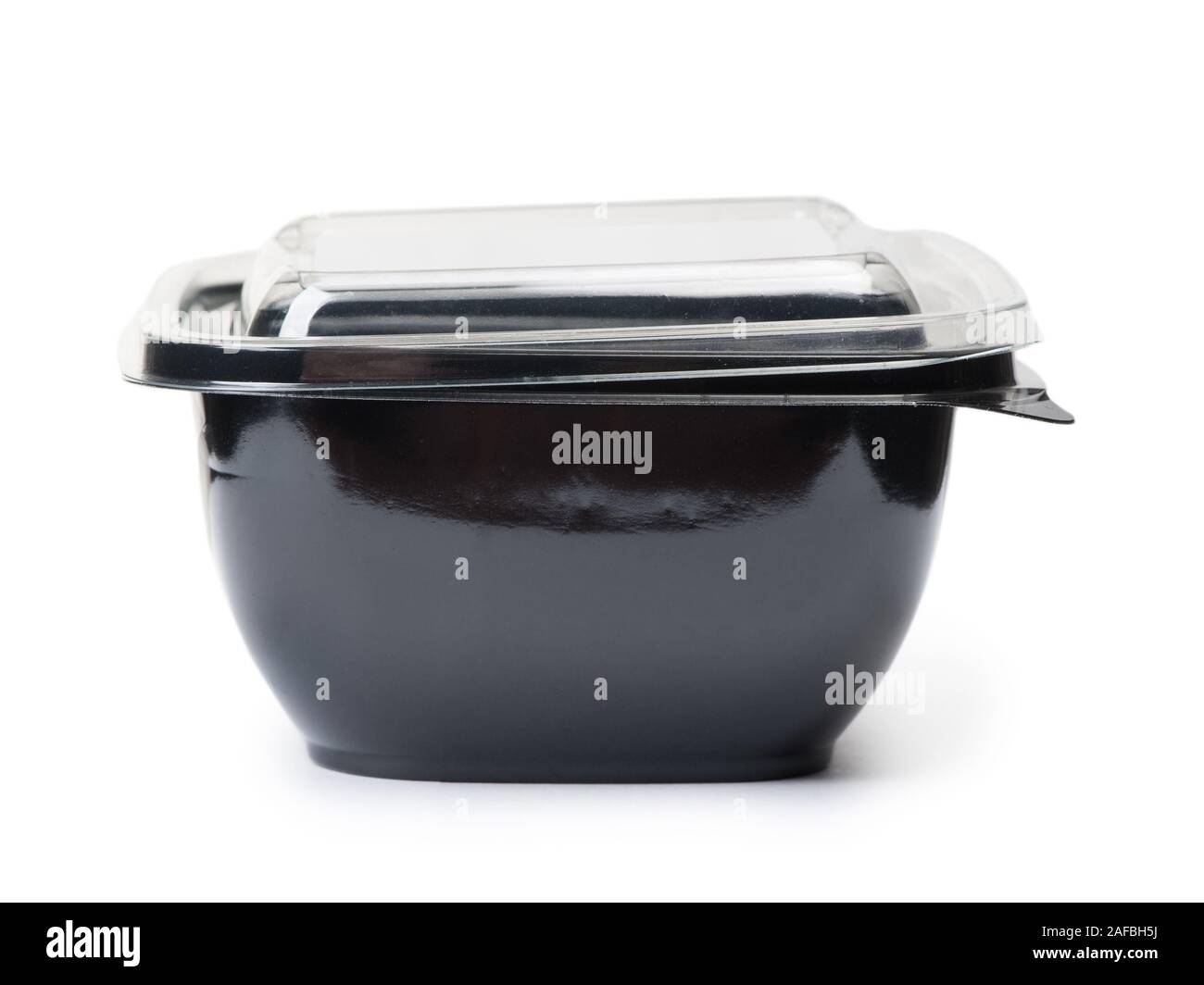 Empty black plastic disposable take out container for food isolated on ...