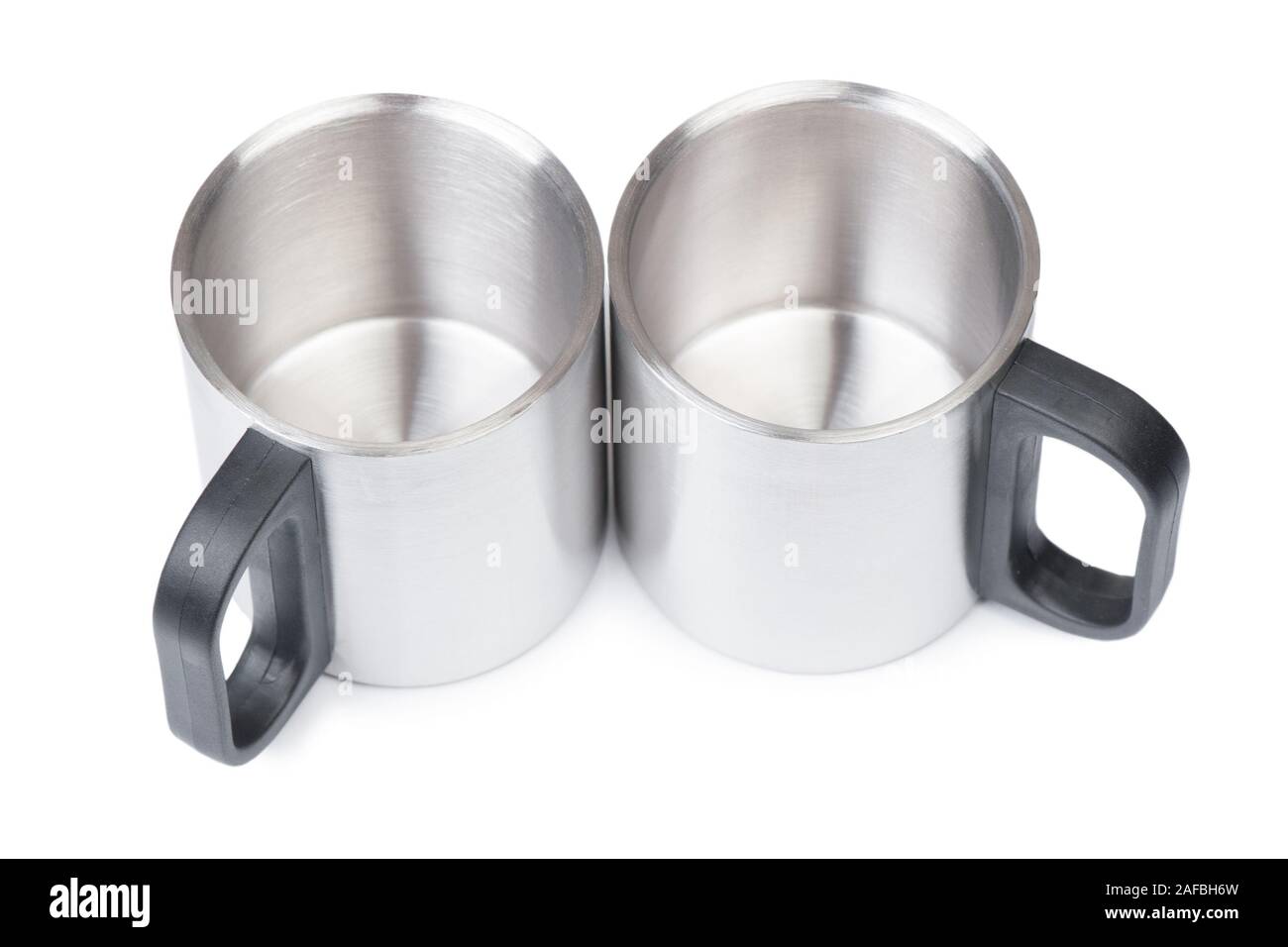 Empty metal mugs isolated on white background Stock Photo - Alamy