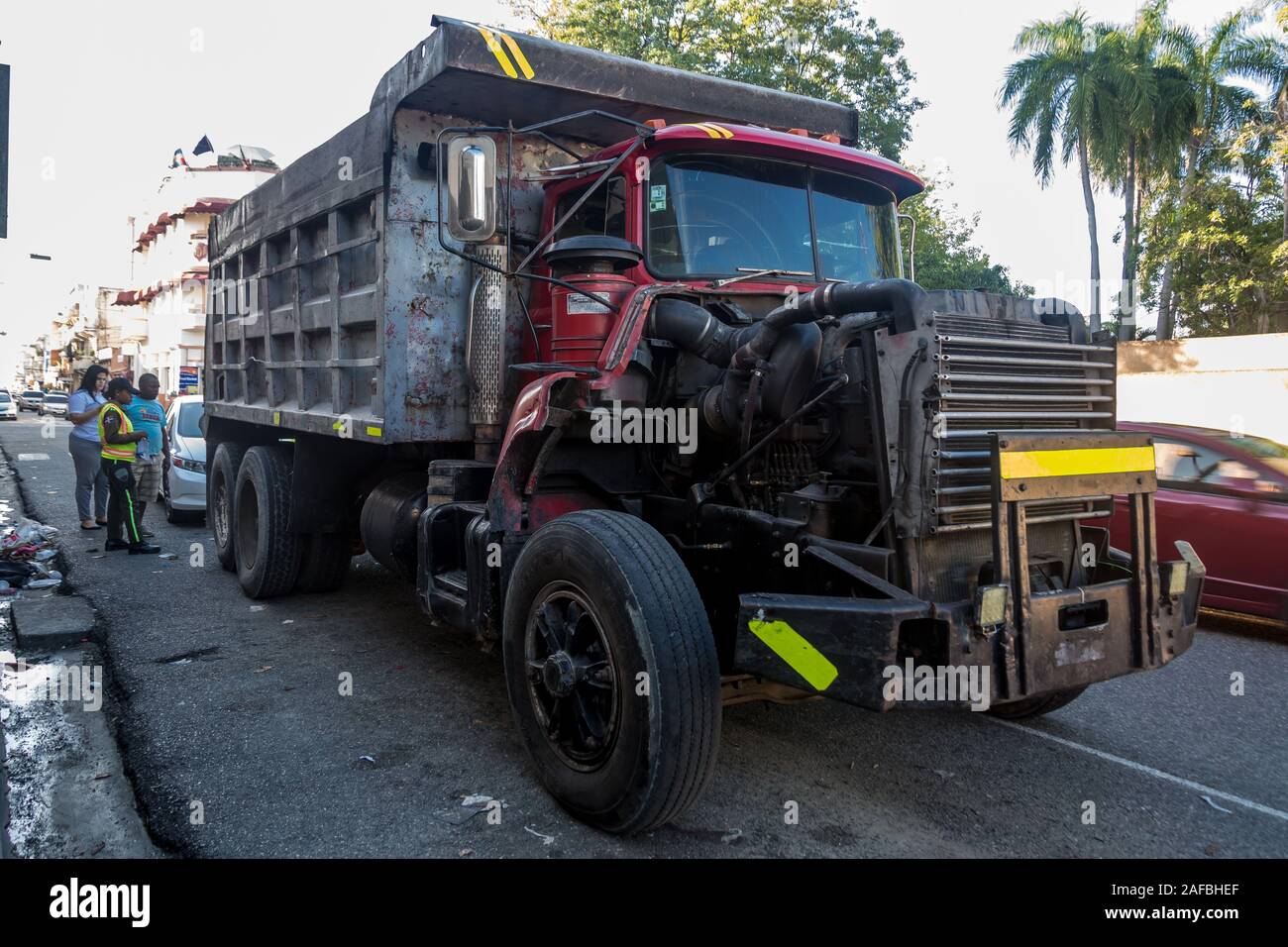 dramatic image of old industrial dump truck missing its front hood and ...