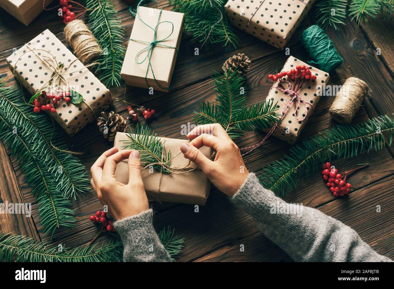 decorate a Christmas present Stock Photo - Alamy