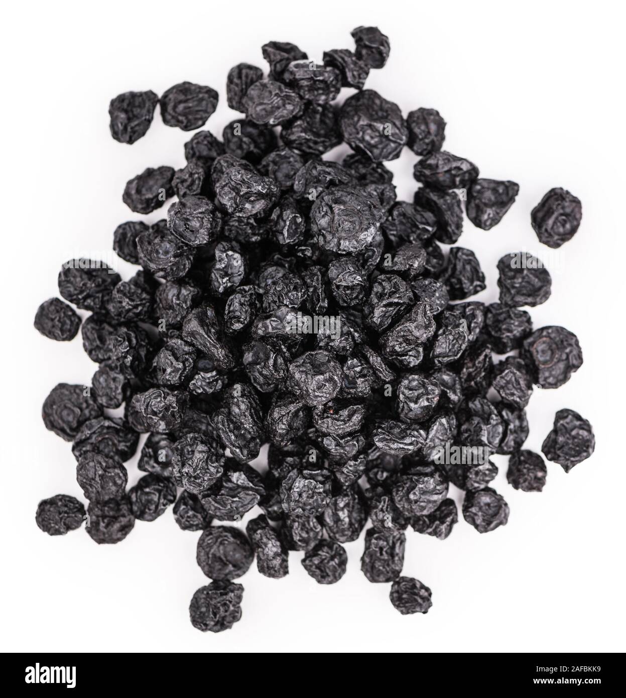Portion of Dried Blueberries as detailed close-up shot isolated on ...