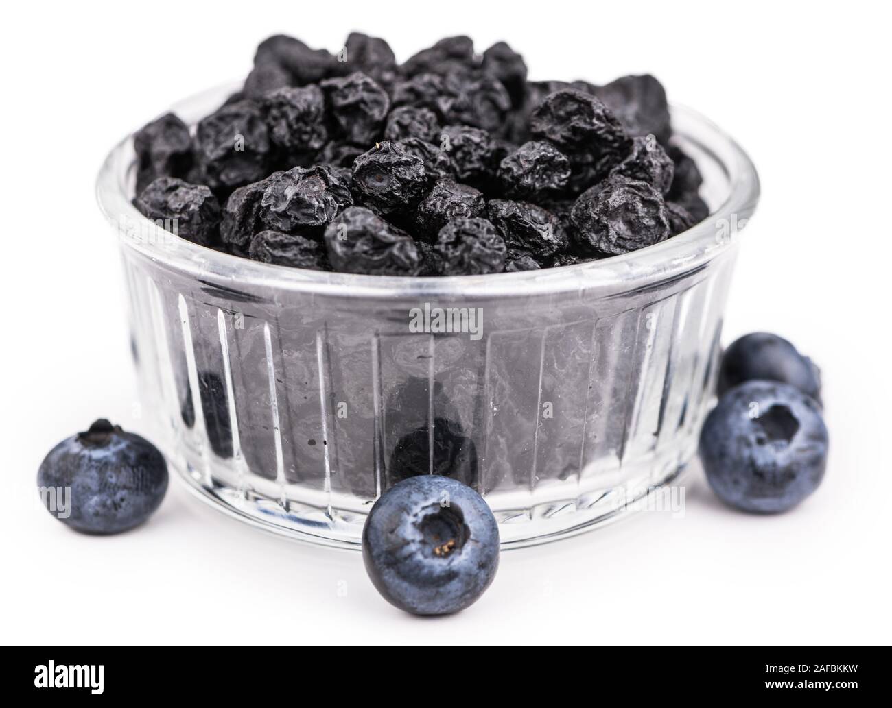 Portion of Dried Blueberries as detailed close-up shot isolated on ...