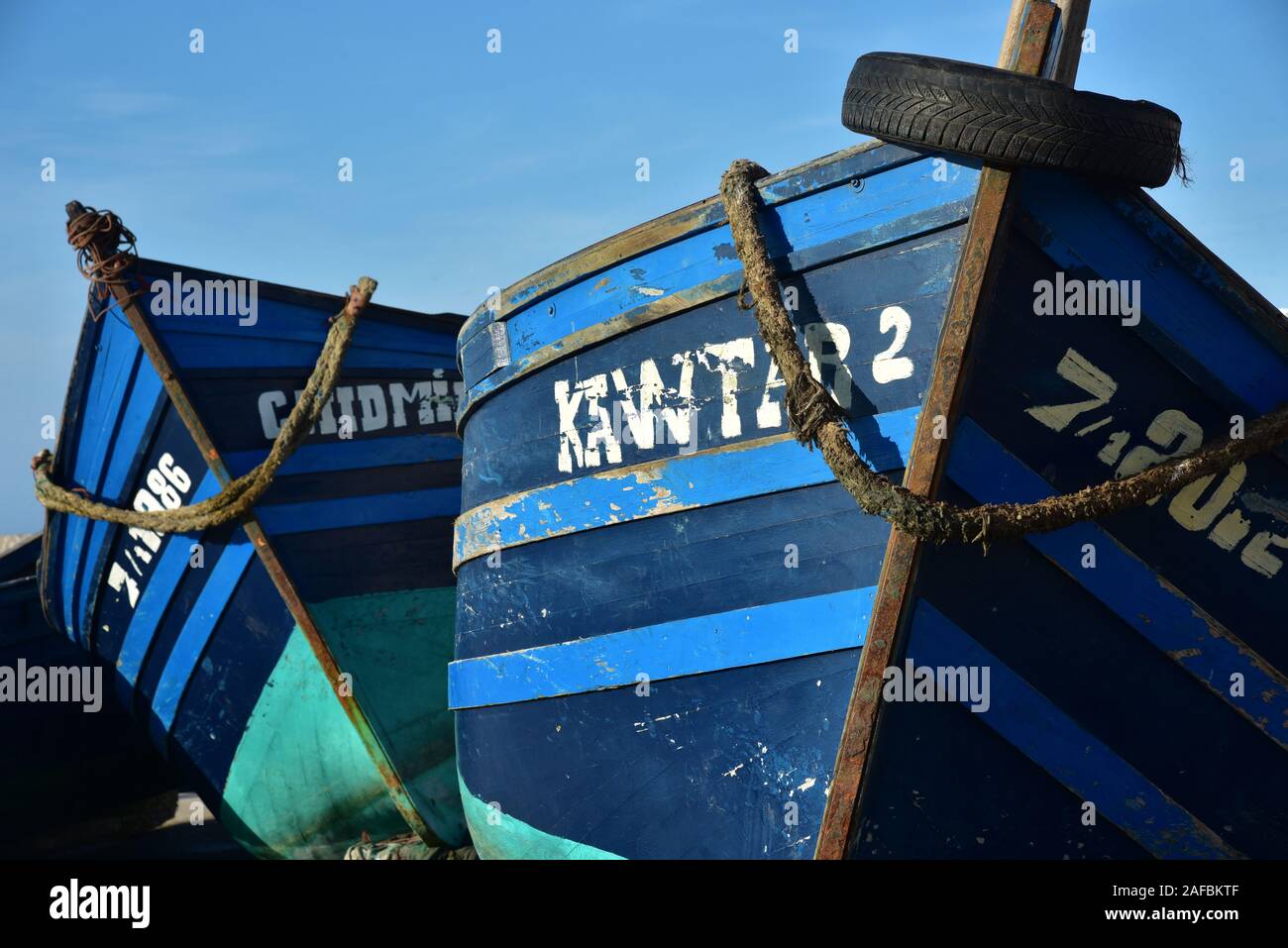 Traditional wooden fishing boats docked at Sqala du Port, once one of ...