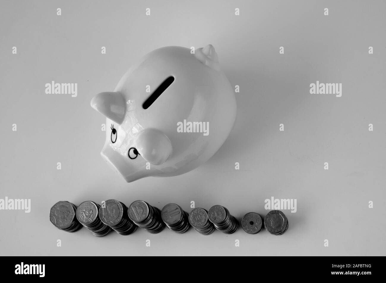 Coin stacks Black and White Stock Photos & Images - Alamy