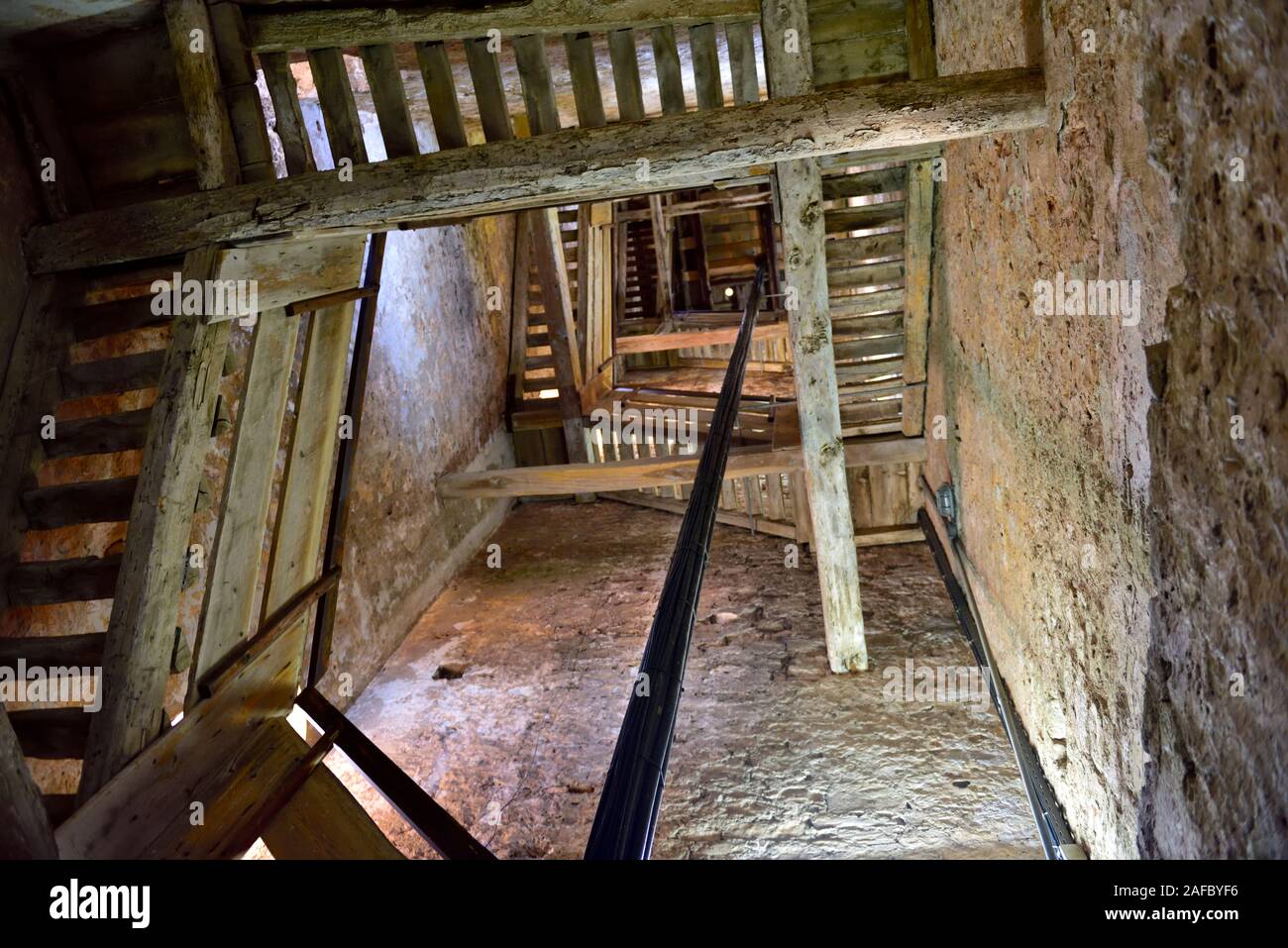 Ancient open wooden stairs going up to top of Church of St. Euphemia ...