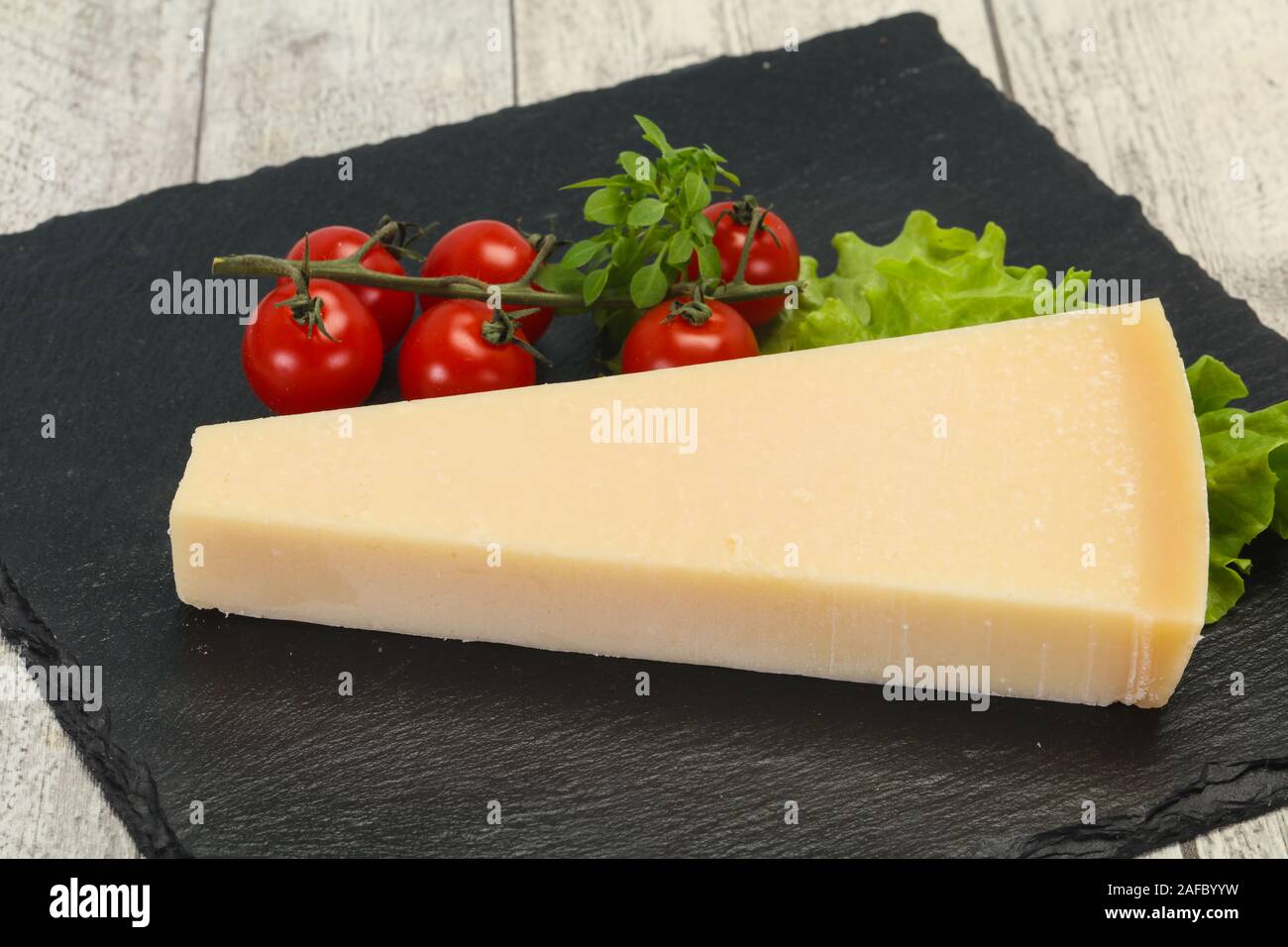 Italian traditional parmesan cheese triangle served salad Stock Photo ...