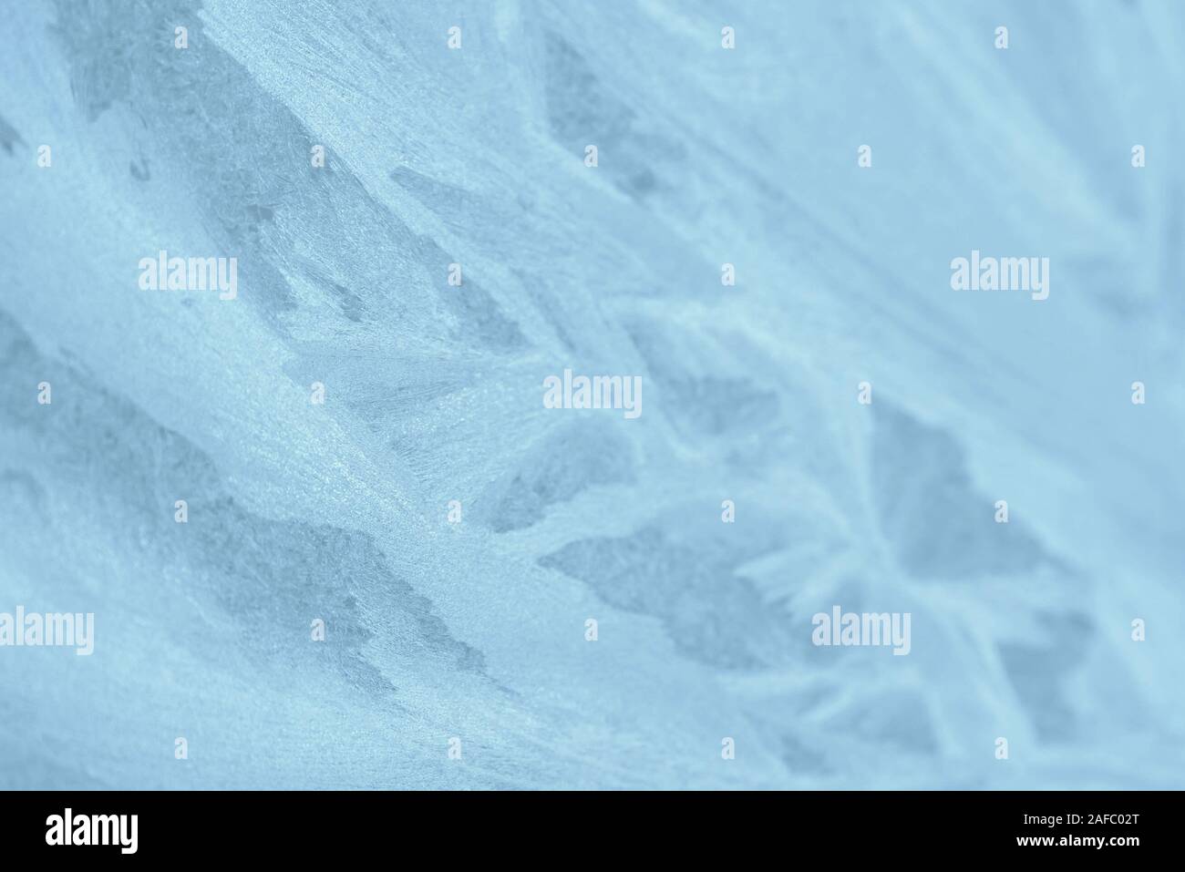 Frosty patterns on the window in winter. Natural abstract background of ...