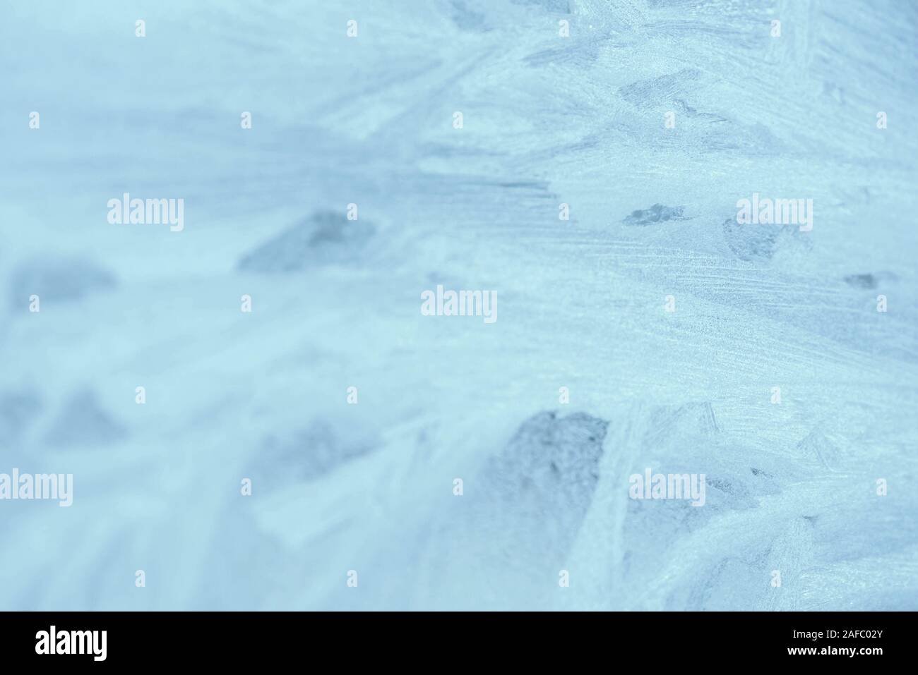 Frosty patterns on the window in winter. Natural abstract background of ...