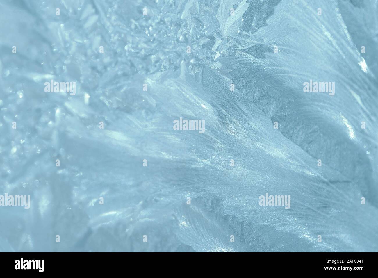 Frosty patterns on the window in winter. Natural abstract background of ...