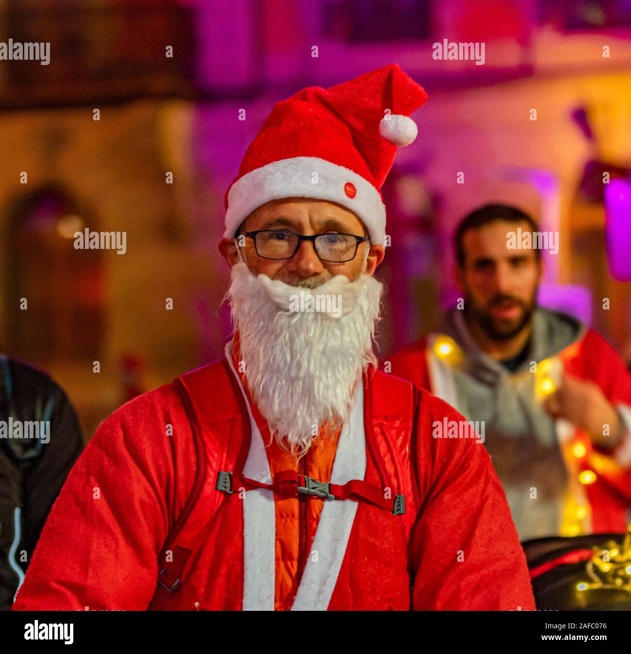 A Santa Claus who is on a December night and who is under a slightly ...
