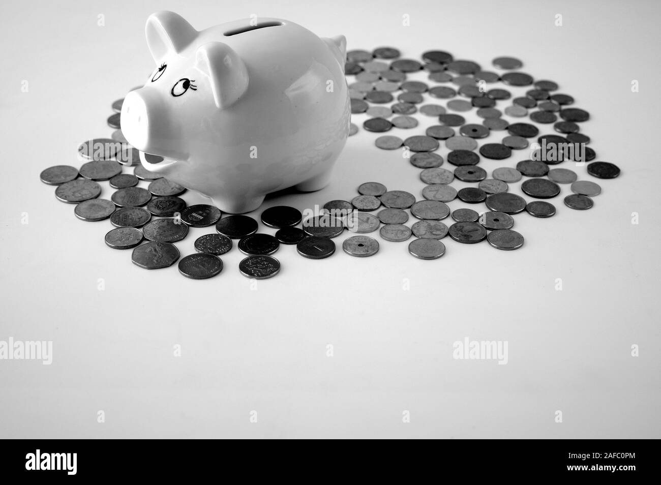 Coin bank commercial Black and White Stock Photos & Images - Alamy