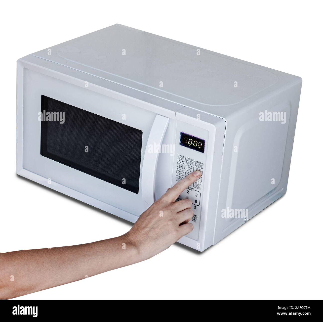 Microwave oven and hand Stock Photo - Alamy