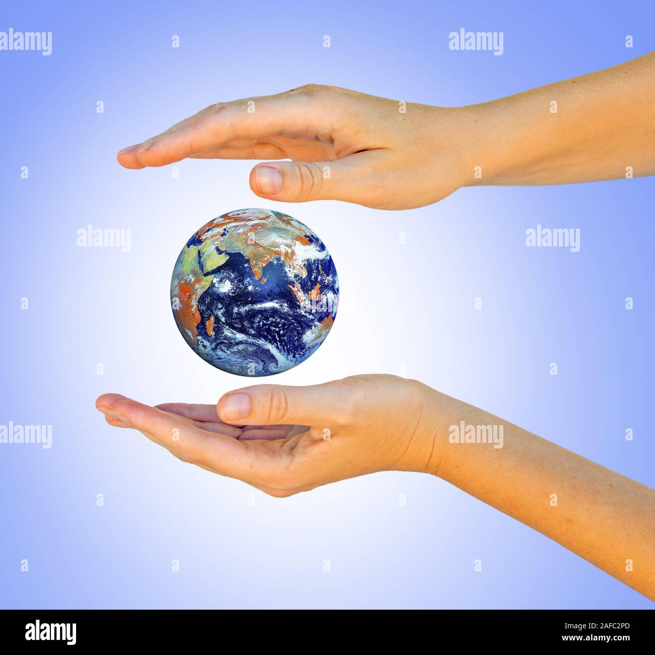 Planet earth on palm.Elements of this image furnished by NASA Stock ...