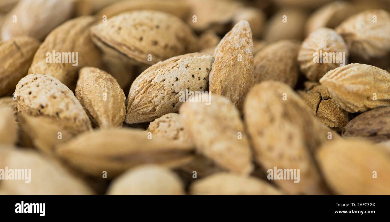 Roasted Almonds (in shell) as full size background image (selective ...