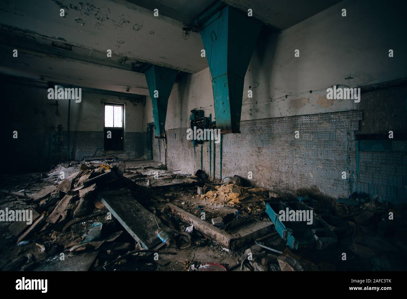 Old broken dirty abandoned industrial building interior Stock Photo - Alamy