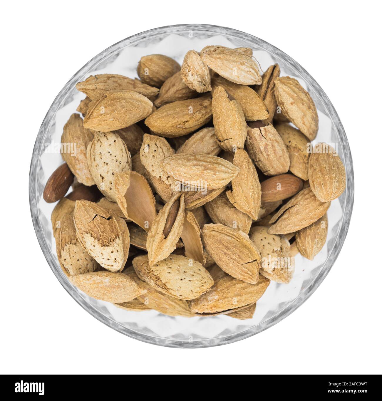 Roasted and salted Almonds (in the shell) isolated on white background ...