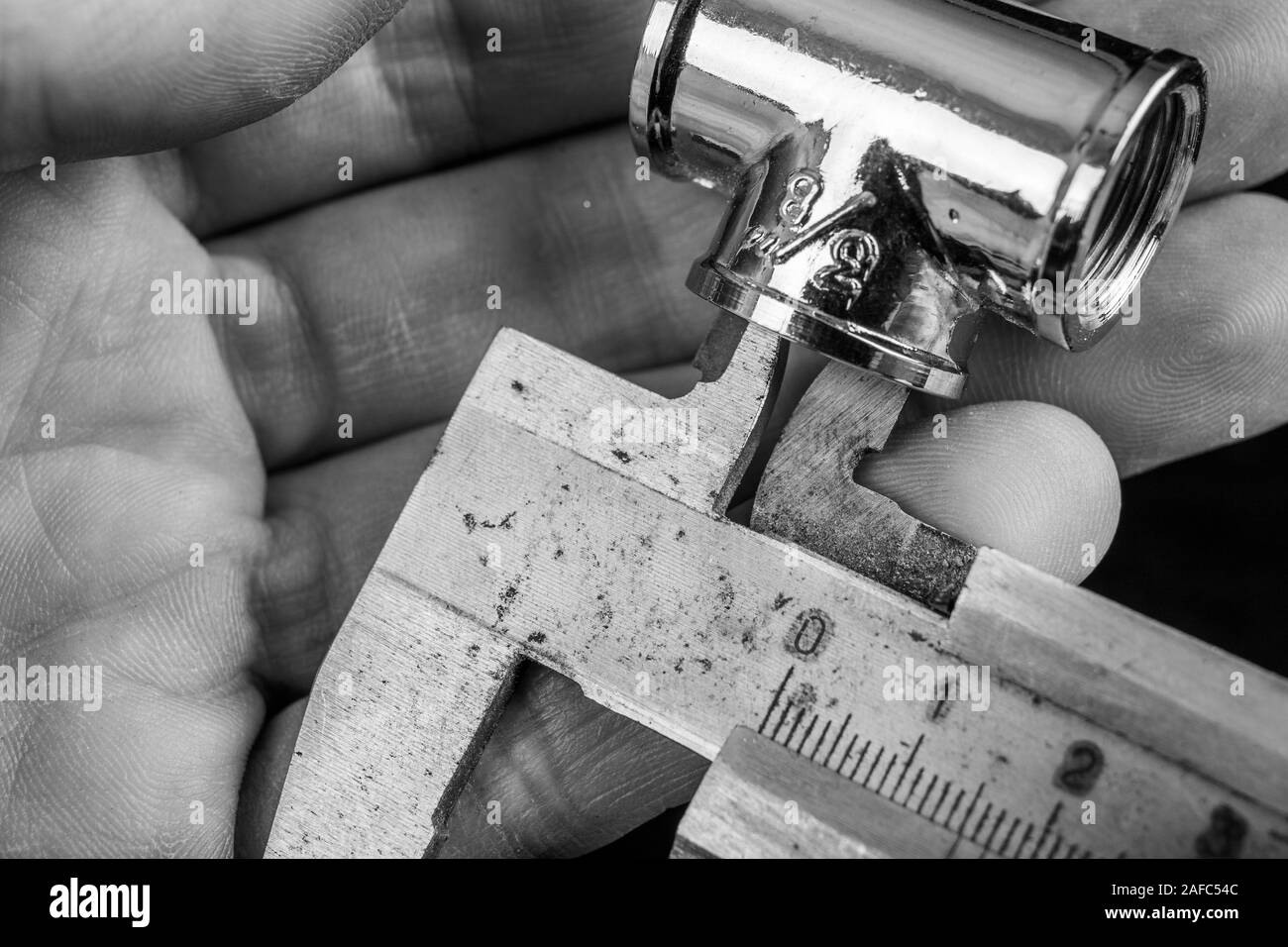 Caliper measurement in the workshop. Checking dimensions of made items ...