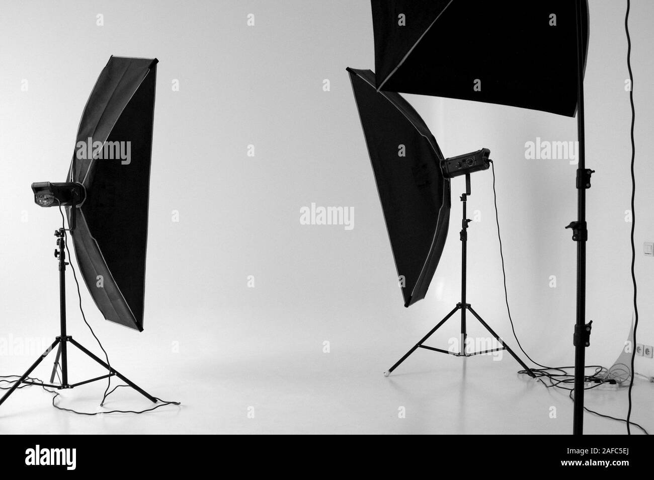 Professional photo studio with lighting equipment Stock Photo - Alamy