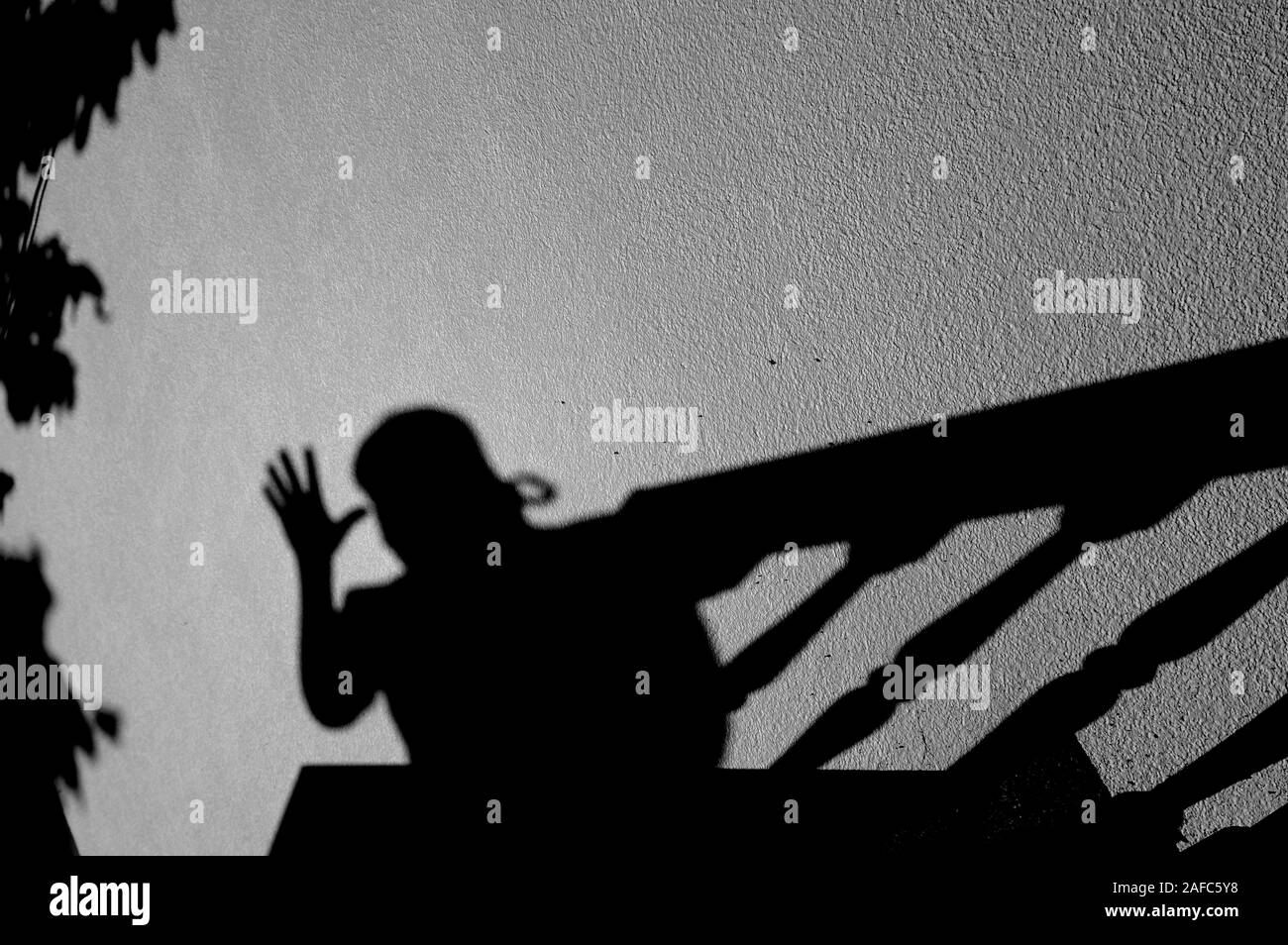 Male white wall background Black and White Stock Photos & Images - Alamy