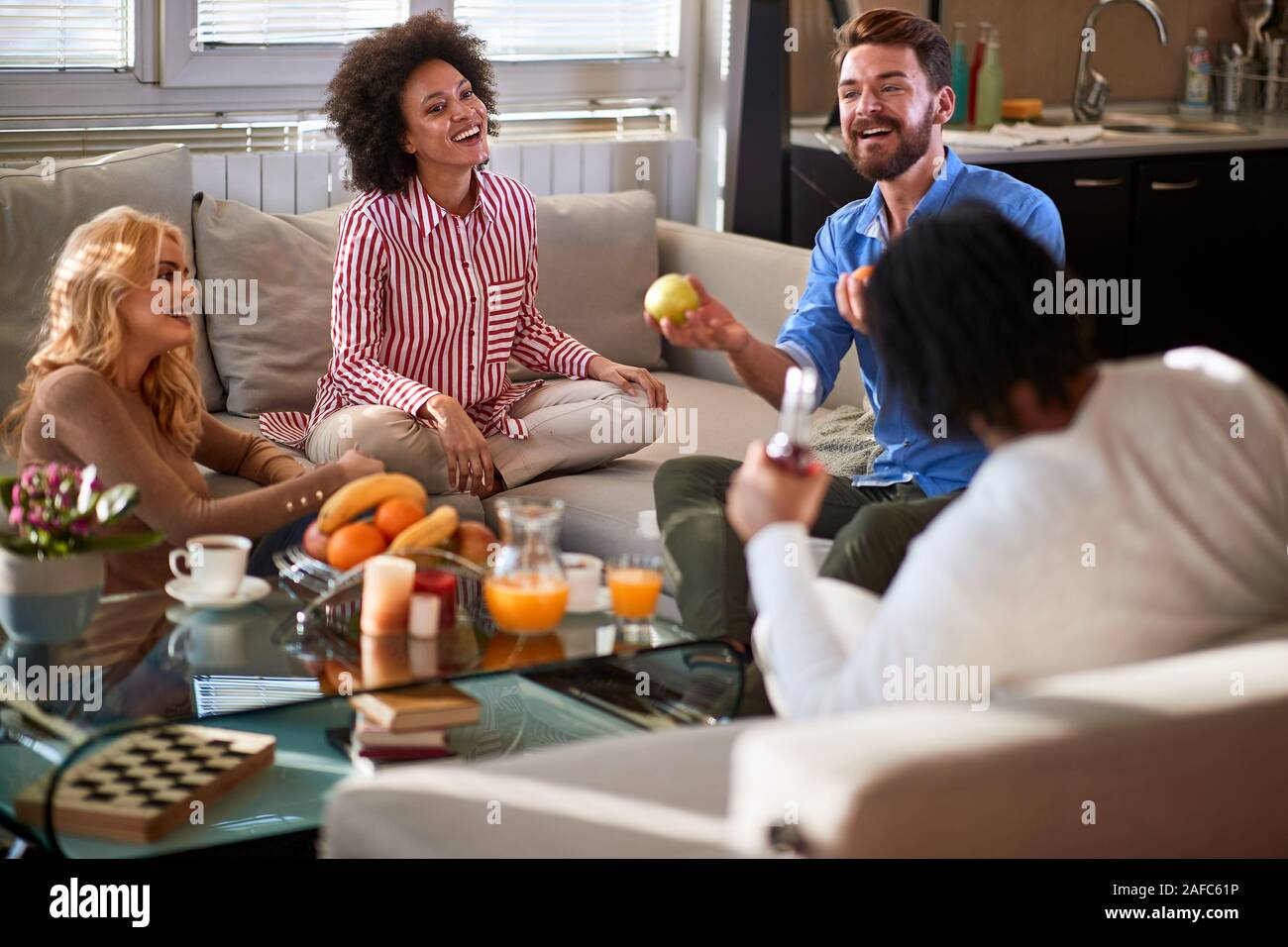 Woman apple inside friends hi-res stock photography and images - Alamy