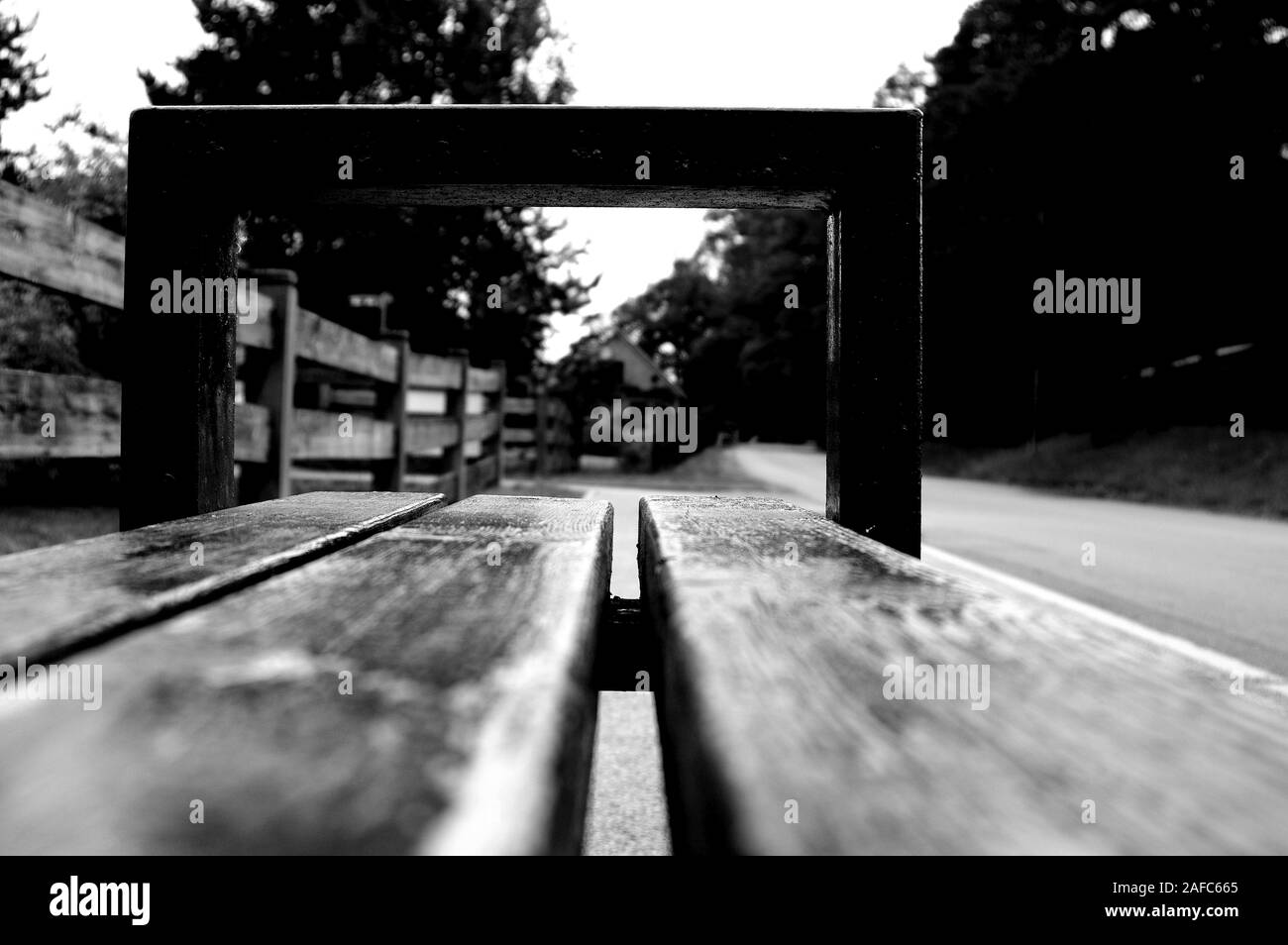 Simple bus stop with bench Stock Photo - Alamy