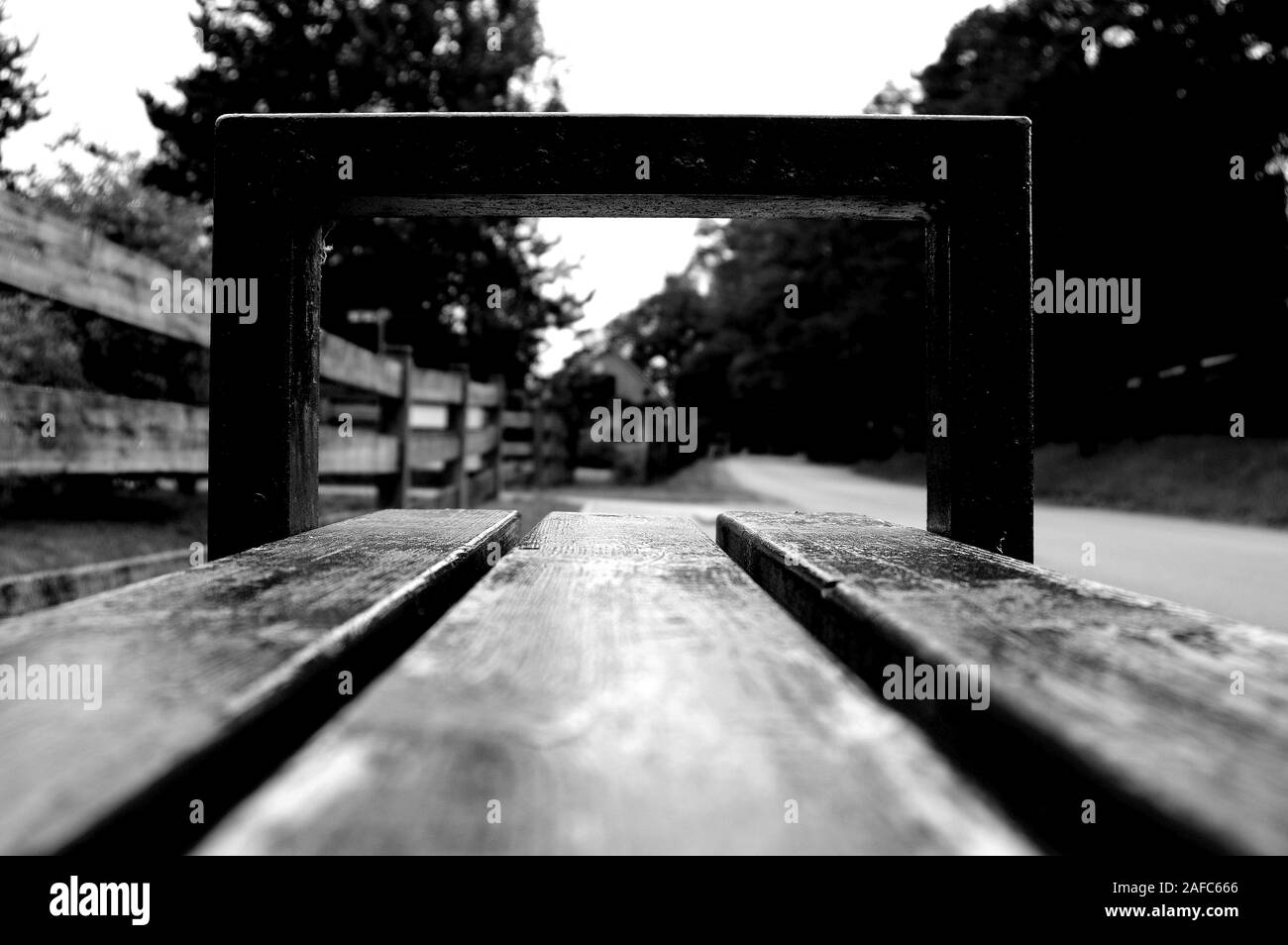 Simple bus stop with bench Stock Photo - Alamy