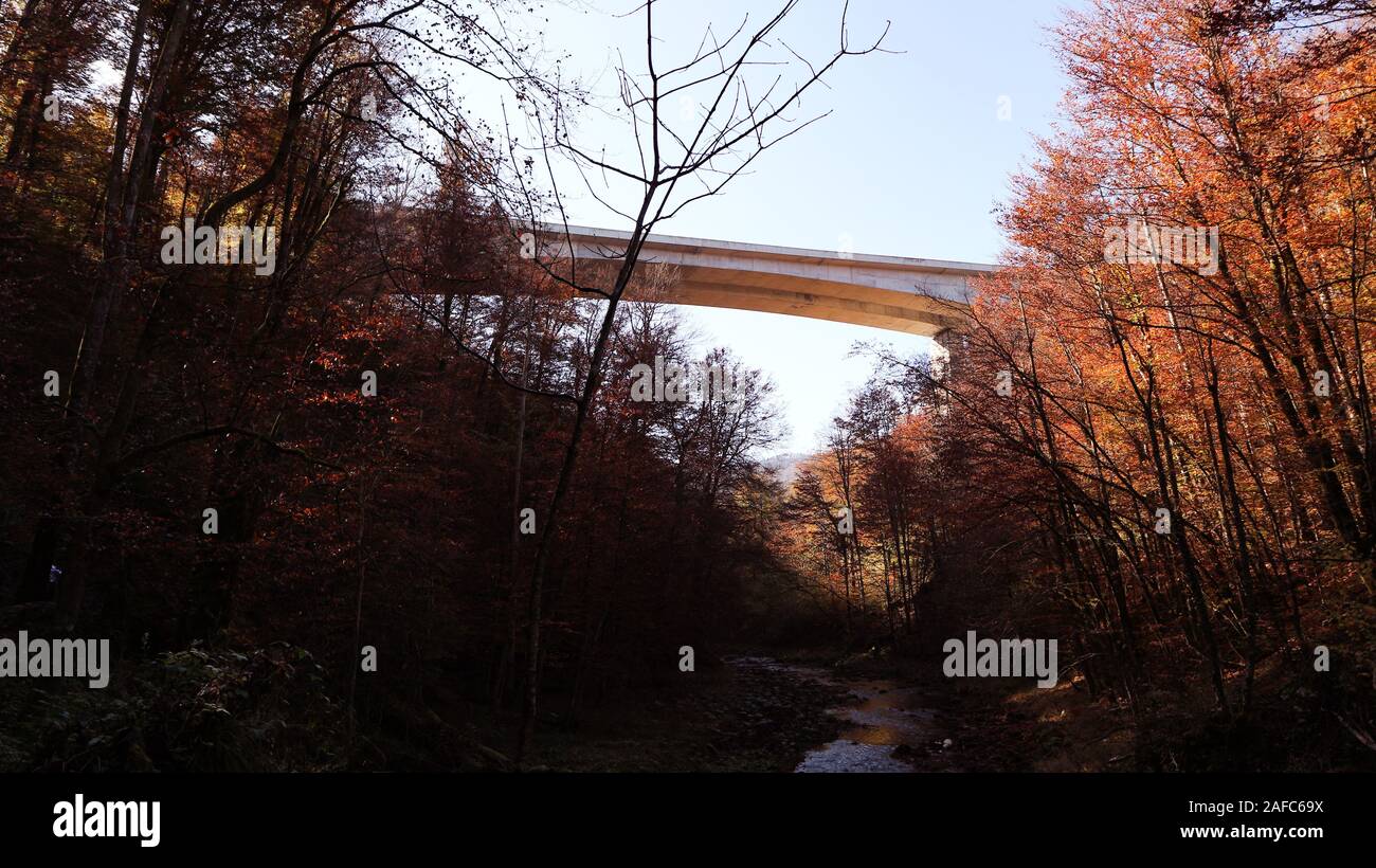 Highway bridge over mountain path Stock Photo - Alamy
