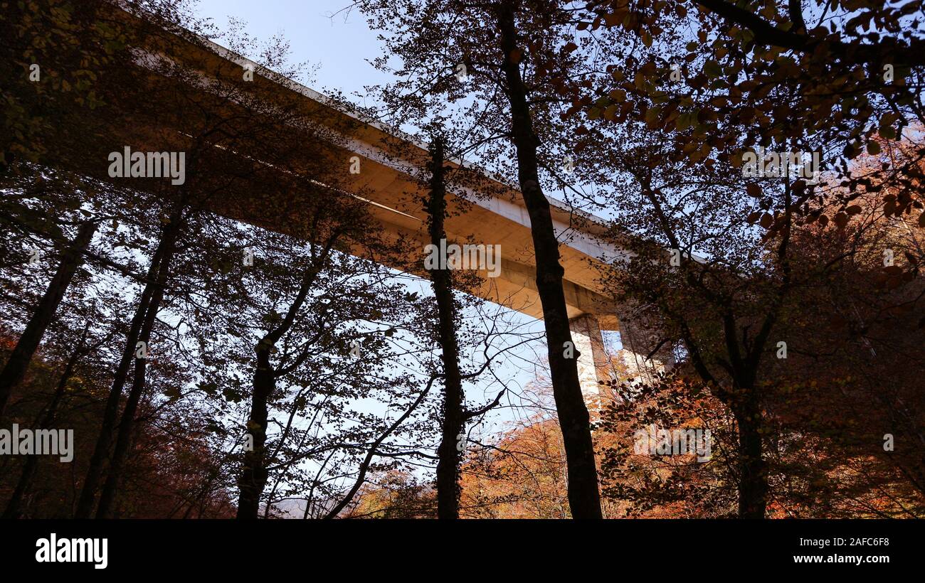 Highway bridge over mountain path Stock Photo - Alamy