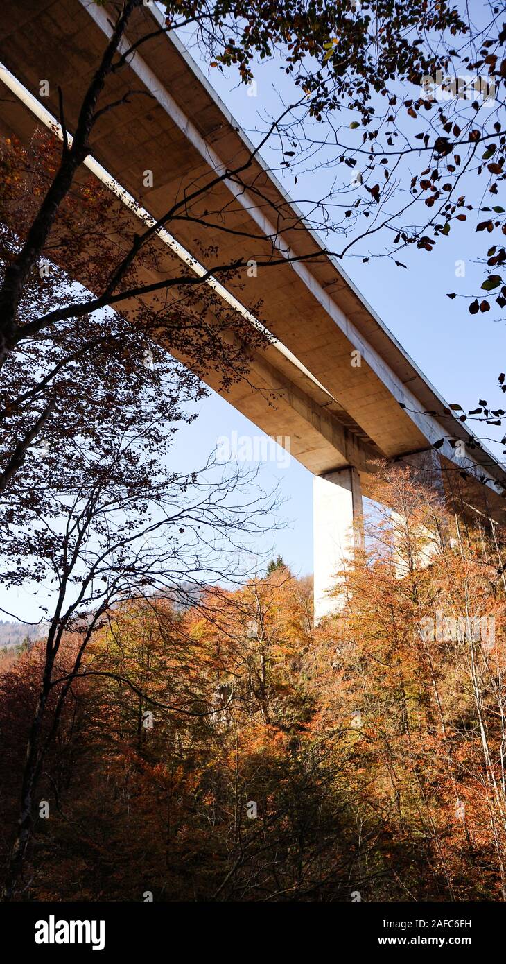 Highway bridge over mountain path Stock Photo - Alamy