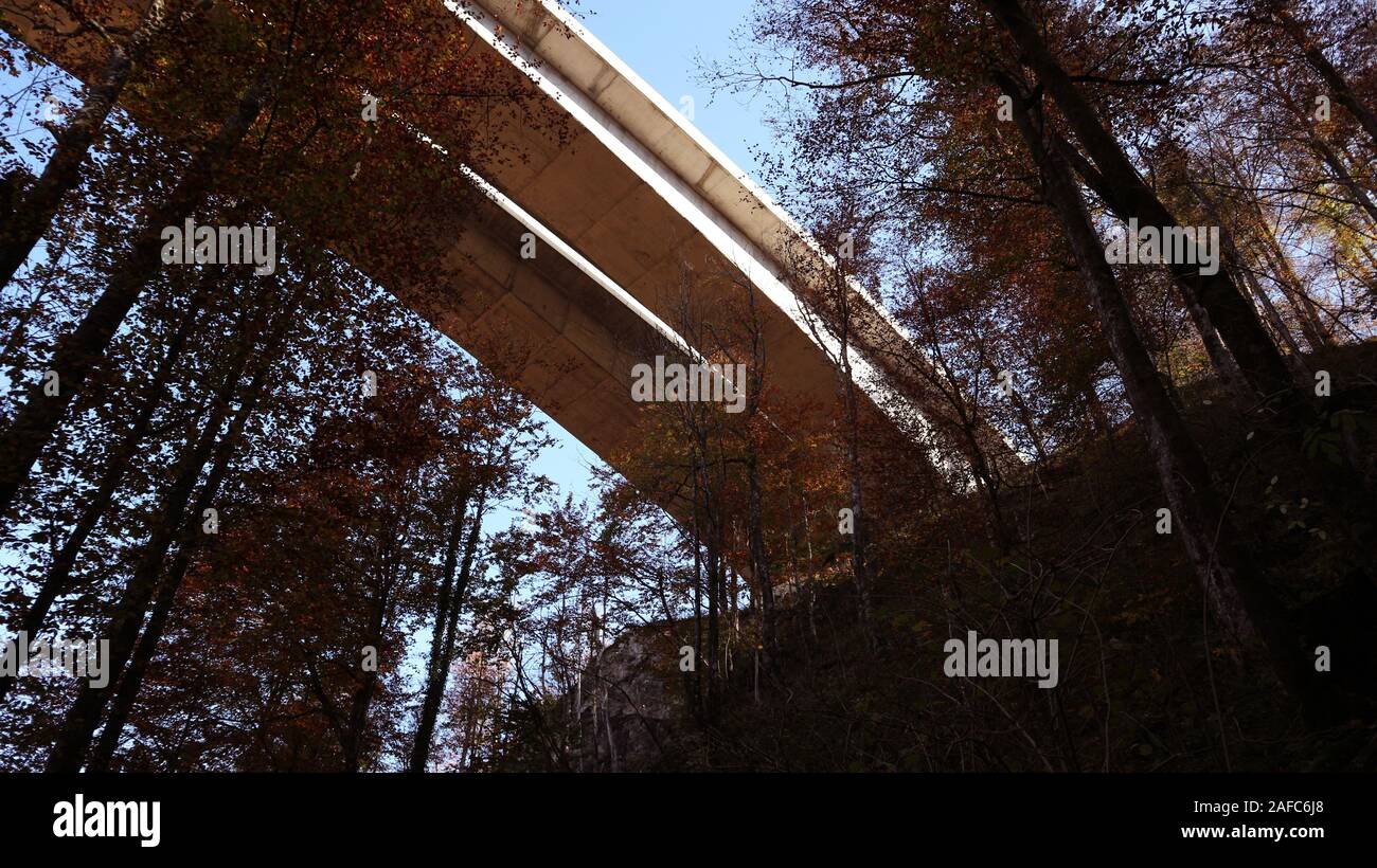 Highway bridge over mountain path Stock Photo - Alamy