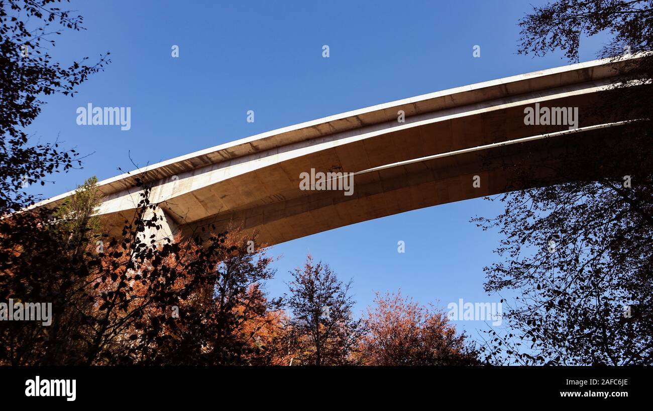 Highway bridge over mountain path Stock Photo - Alamy