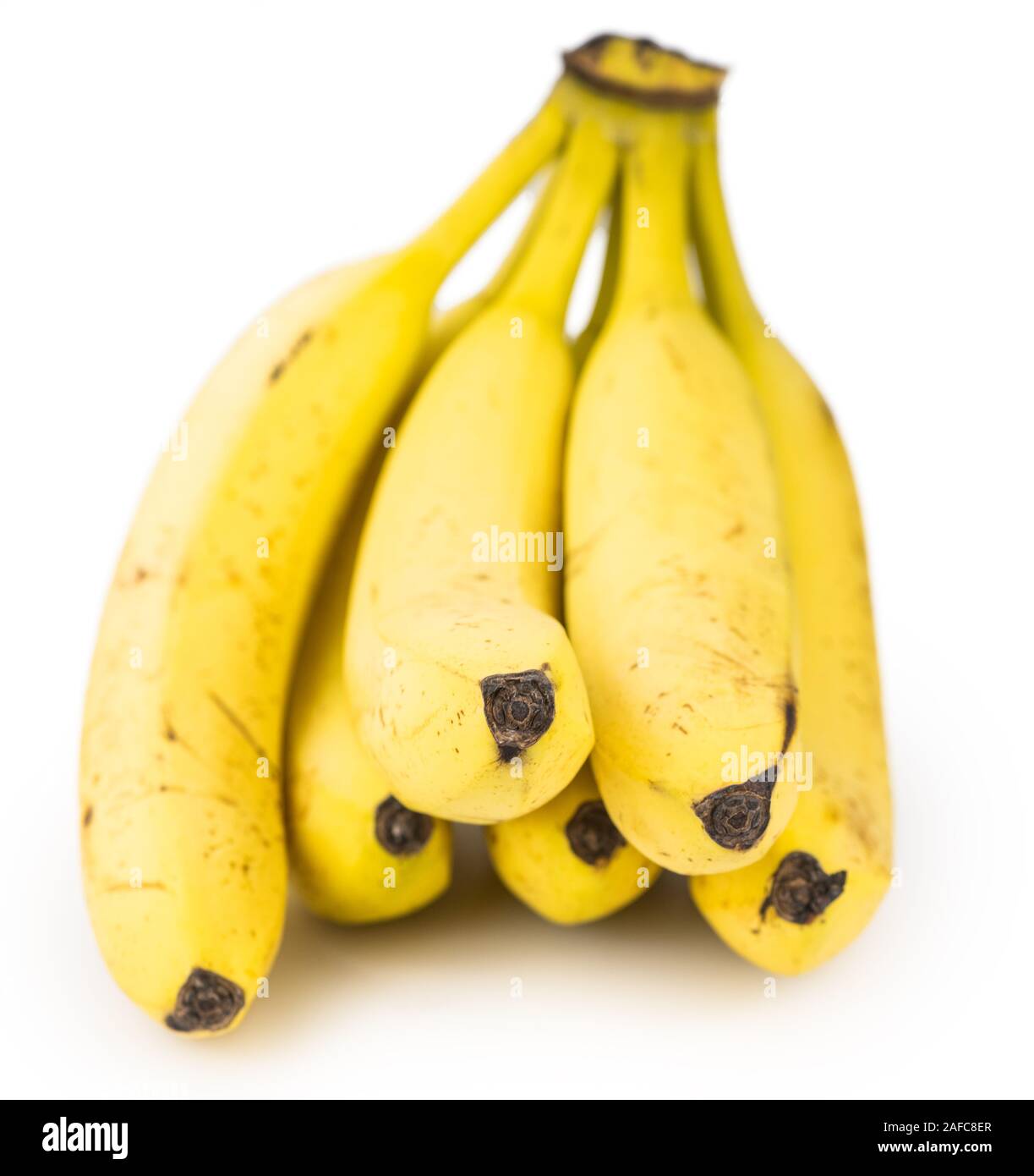 Portion of Whole Bananas as detailed close-up shot isolated on white ...