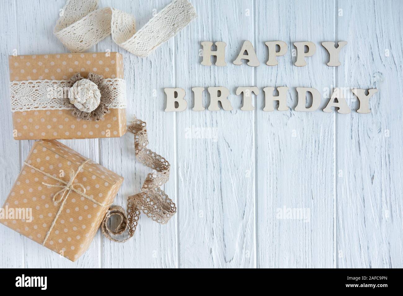 Happy Birthday. Greeting inscription from wooden letters on a light ...