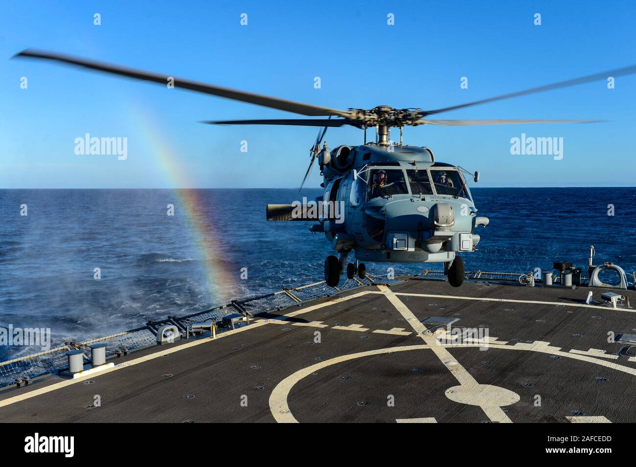 PACIFIC OCEAN (Dec. 9, 2019) An MH-60R Sea Hawk, assigned to the “Wolf ...