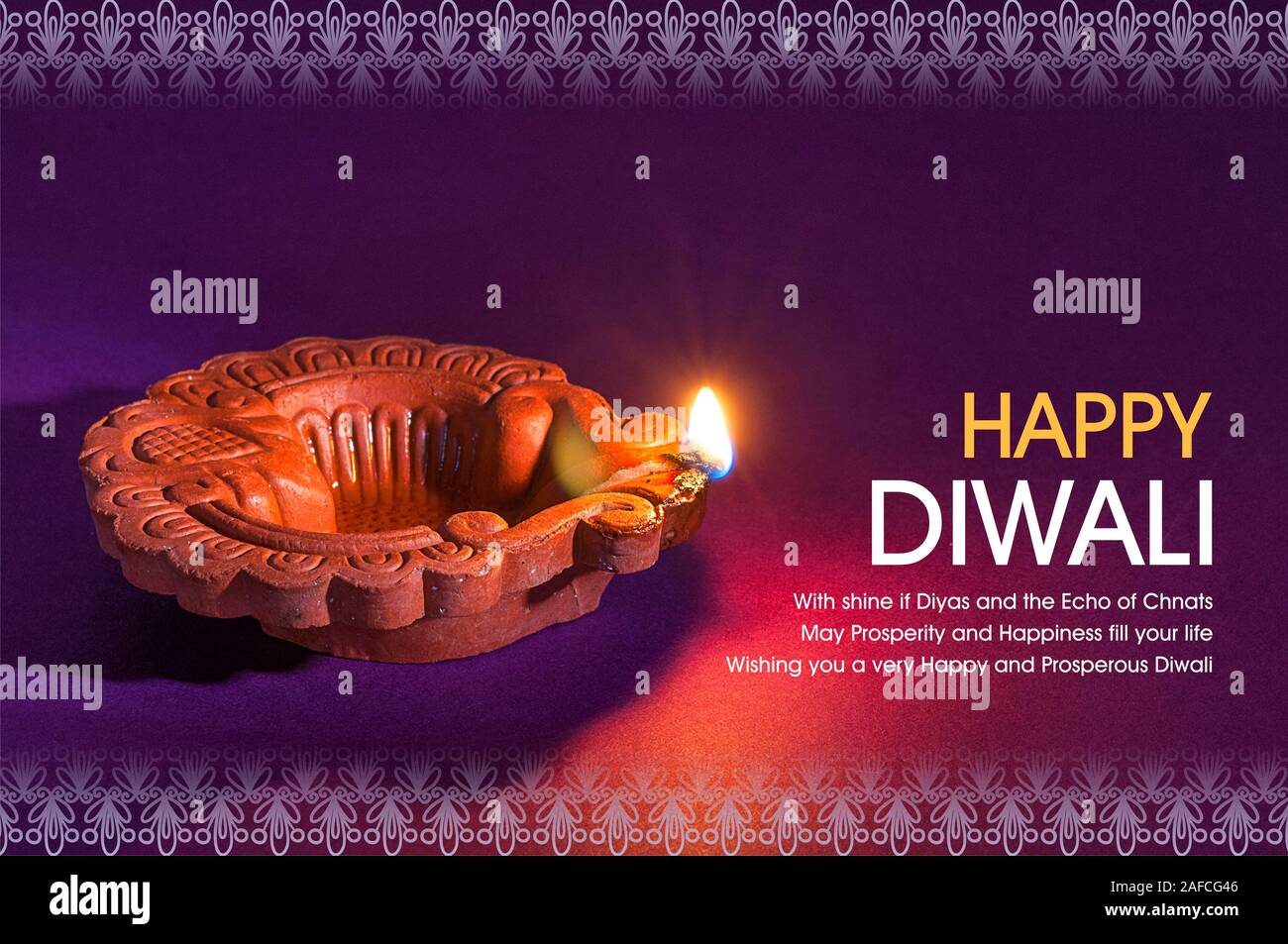 Greetings Card Design: Clay diya lamps lit during Diwali Celebration ...