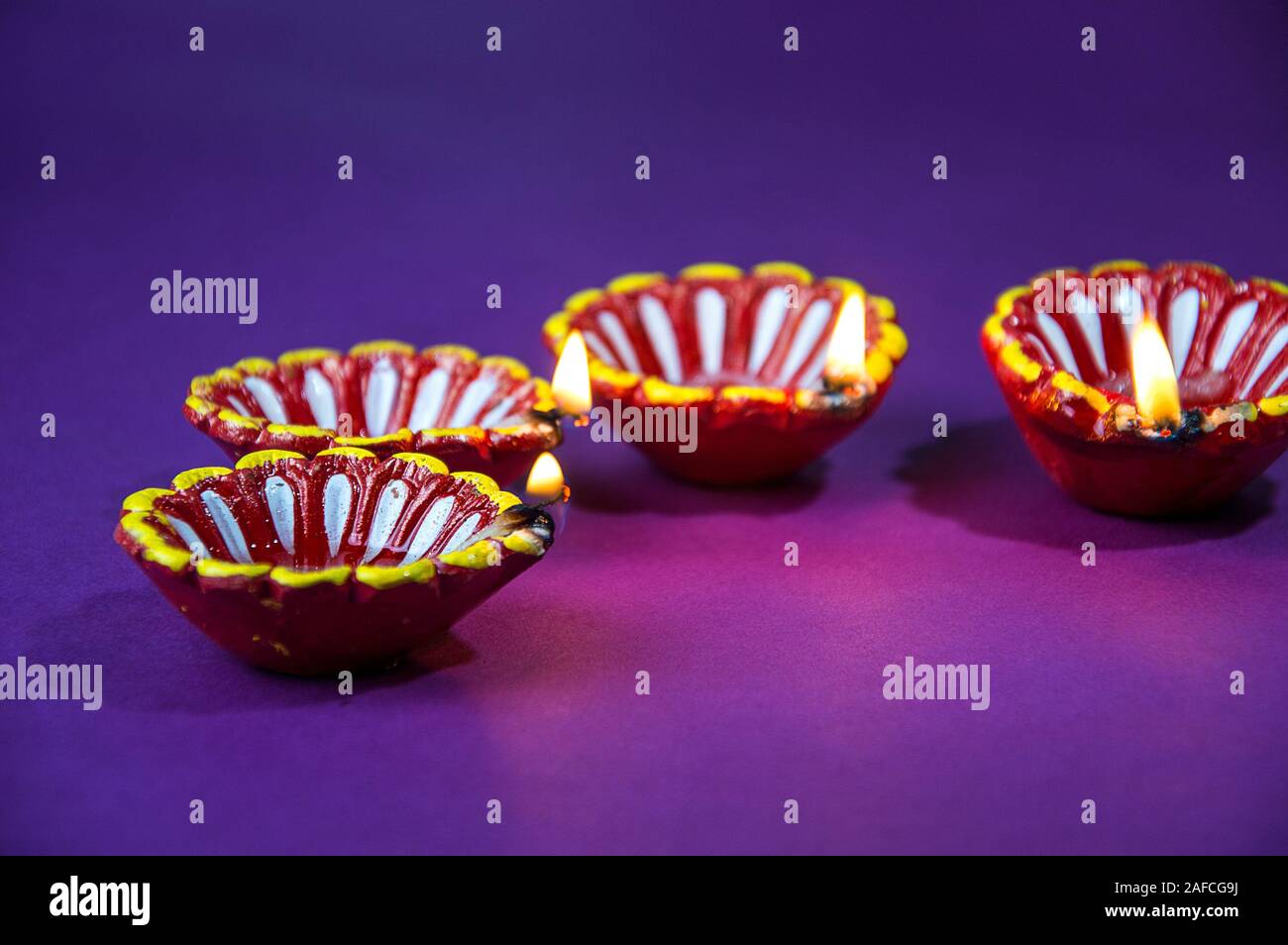 Clay diya lamps lit during Diwali Celebration. Greetings Card Design ...