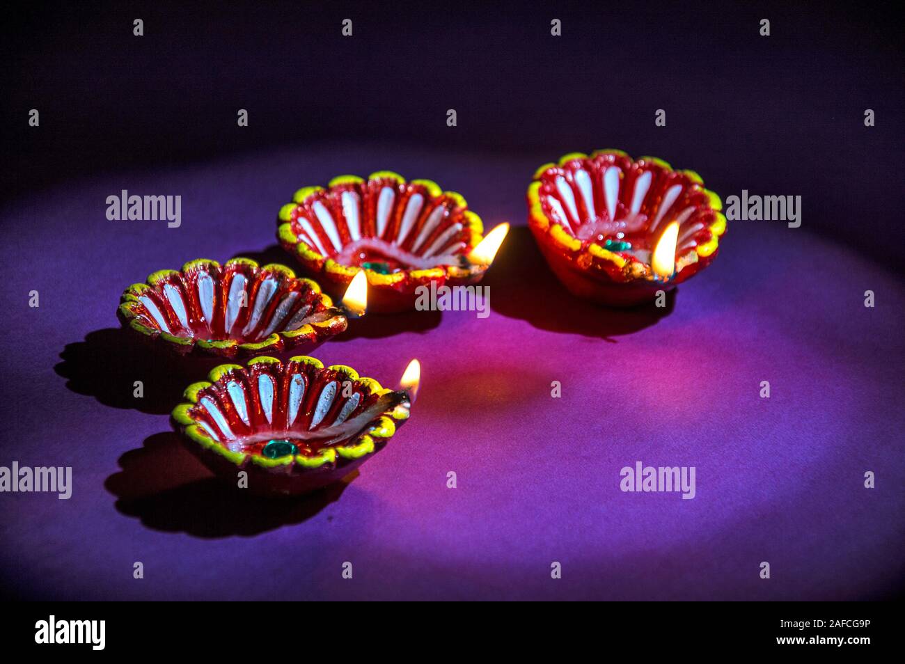 Clay diya lamps lit during Diwali Celebration. Greetings Card Design ...